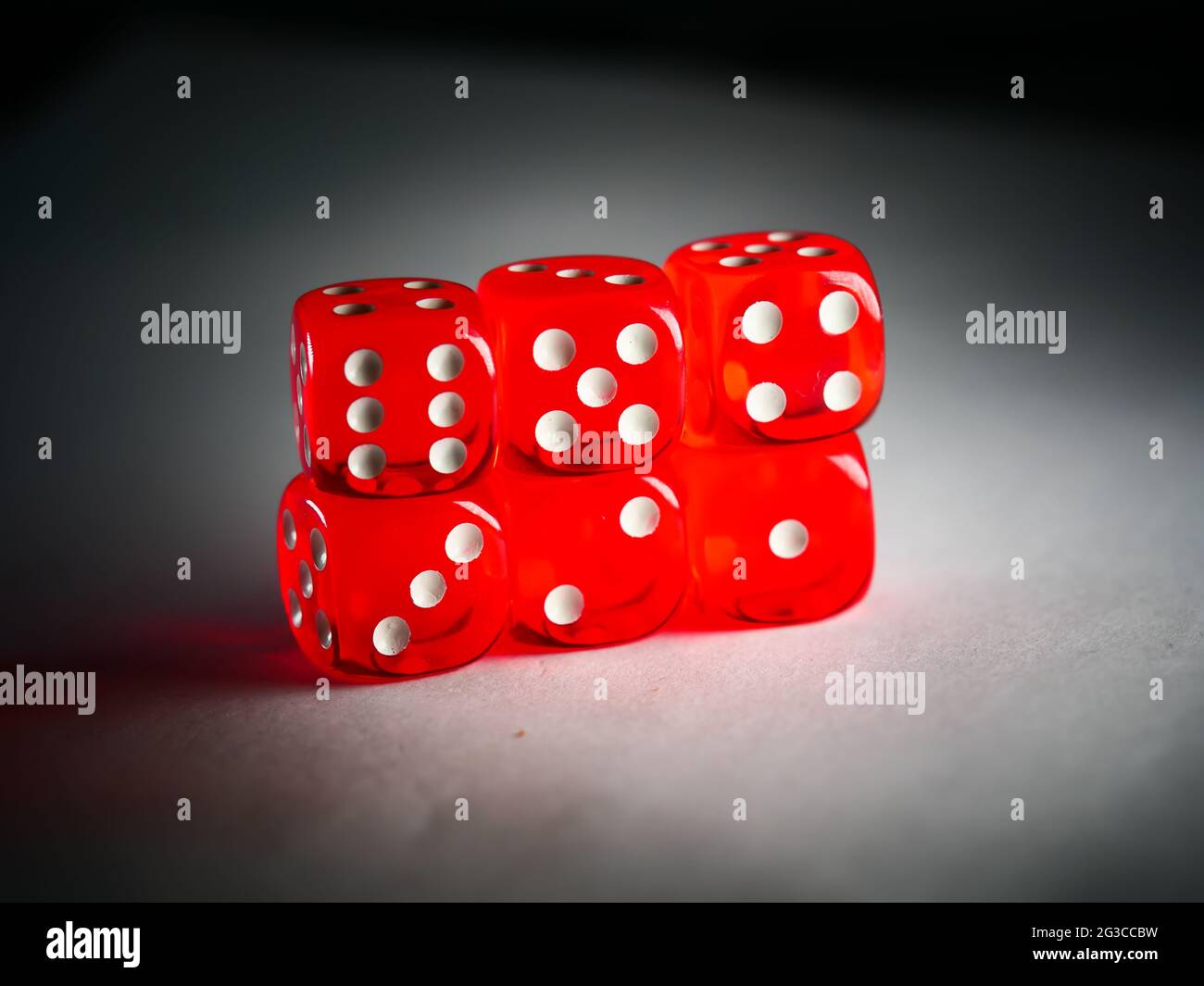Closeup shot of a stack of red die Stock Photo - Alamy