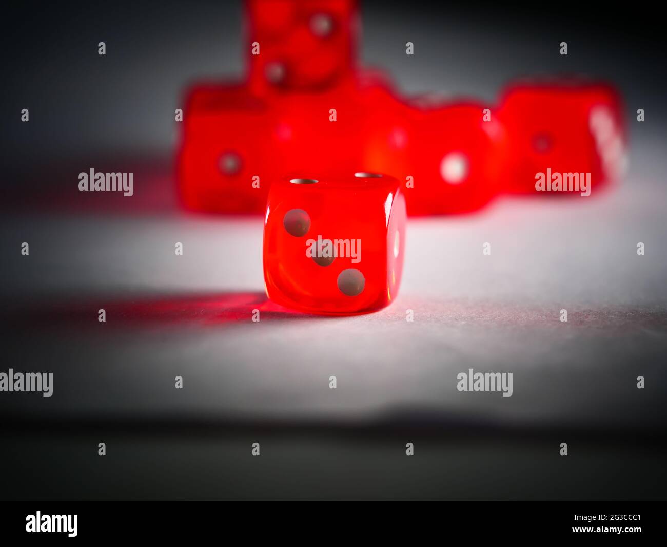 Closeup shot of a group of red die Stock Photo - Alamy