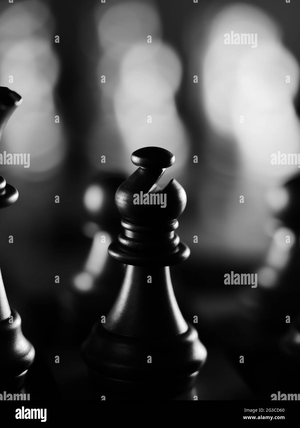 Vertical closeup shot of metallic dark chess pieces Stock Photo - Alamy