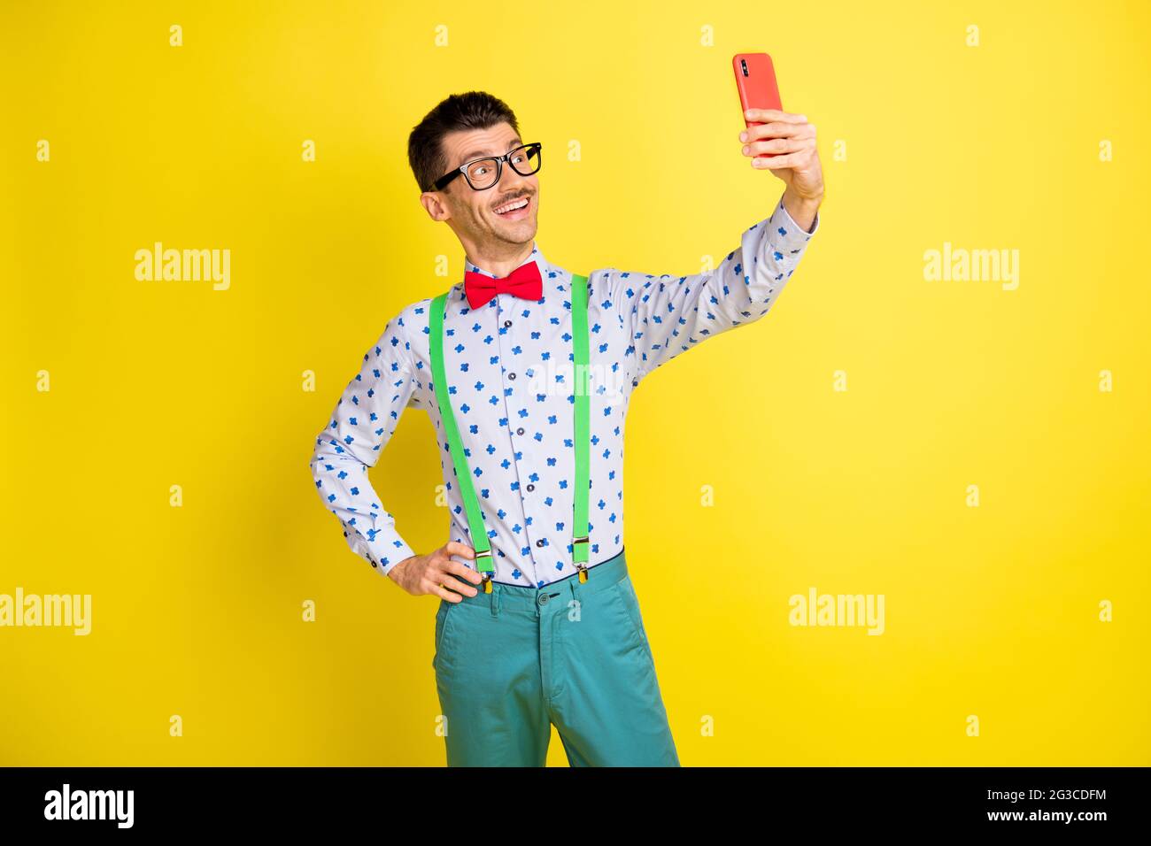 Portrait of handsome cheerful guy taking making selfie posing isolated ...