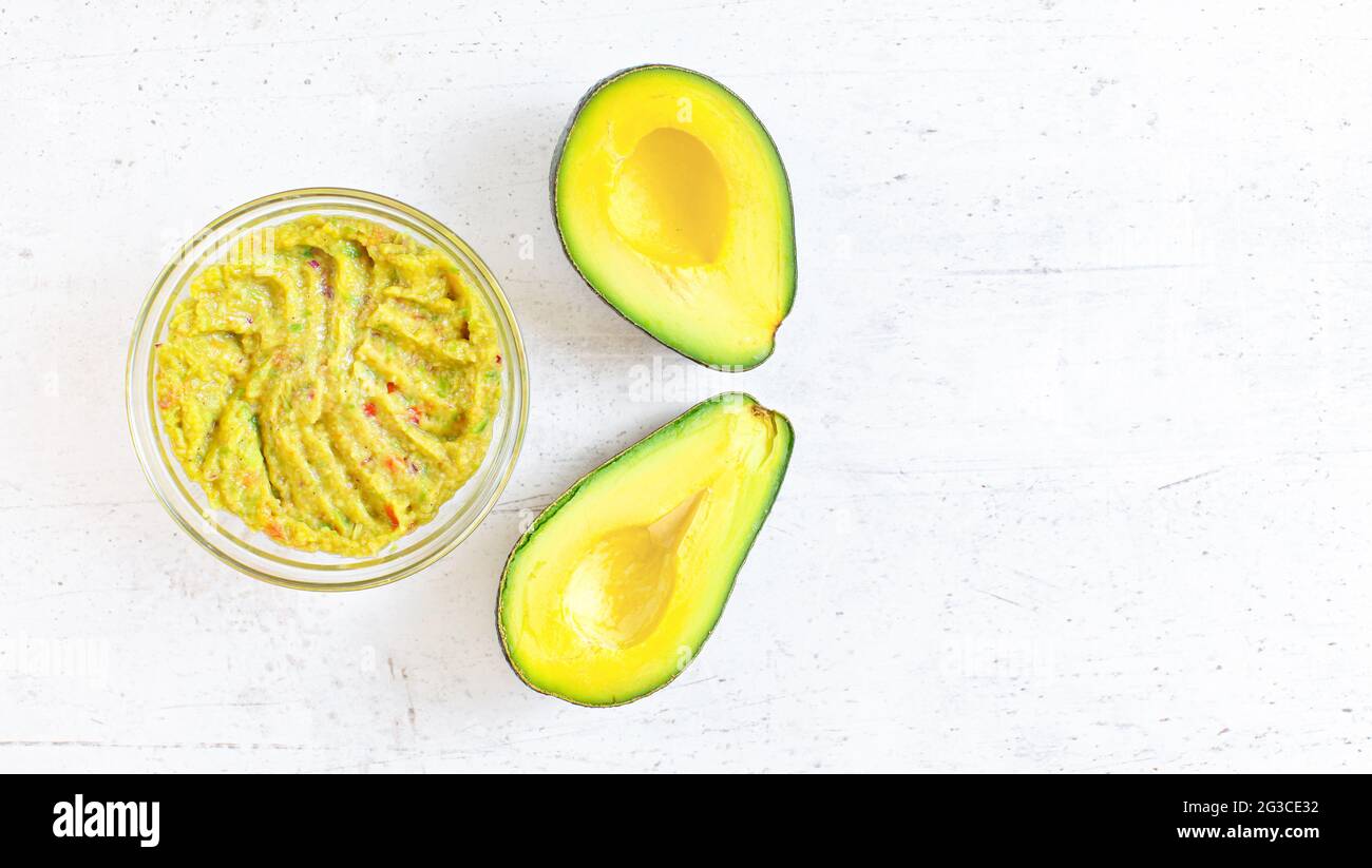 Side view half organic avocado hi-res stock photography and images - Alamy