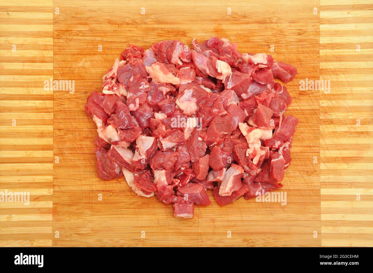 Clean very fresh red raw meat beef, bamboo on cutting board Stock Photo ...