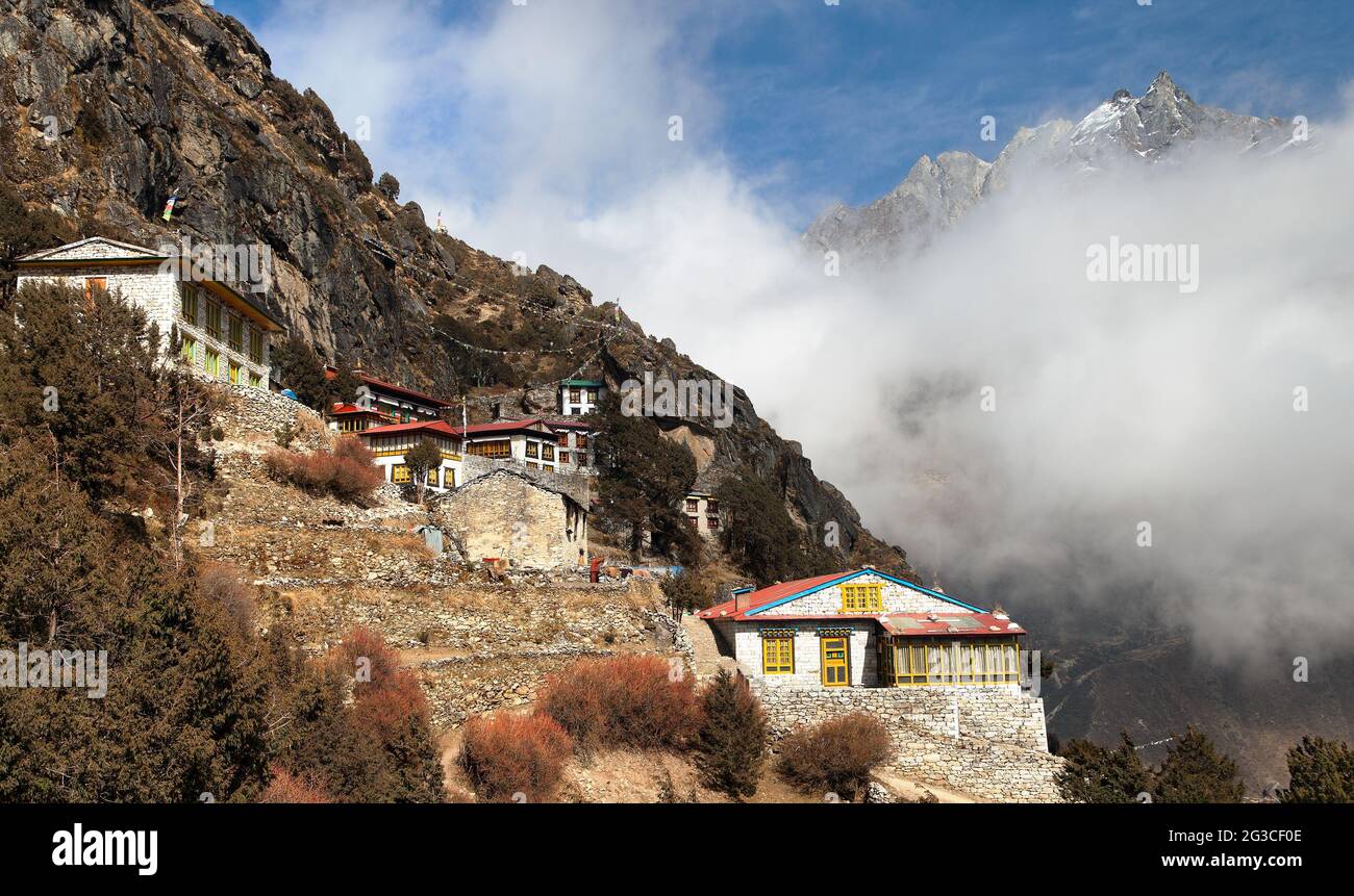 Thame gompa with prayer flags and buddhist symbols - monastery in ...