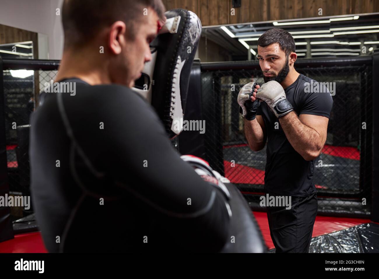 Strong Confident Fighter or Wrestler Training With Professional MMA ...