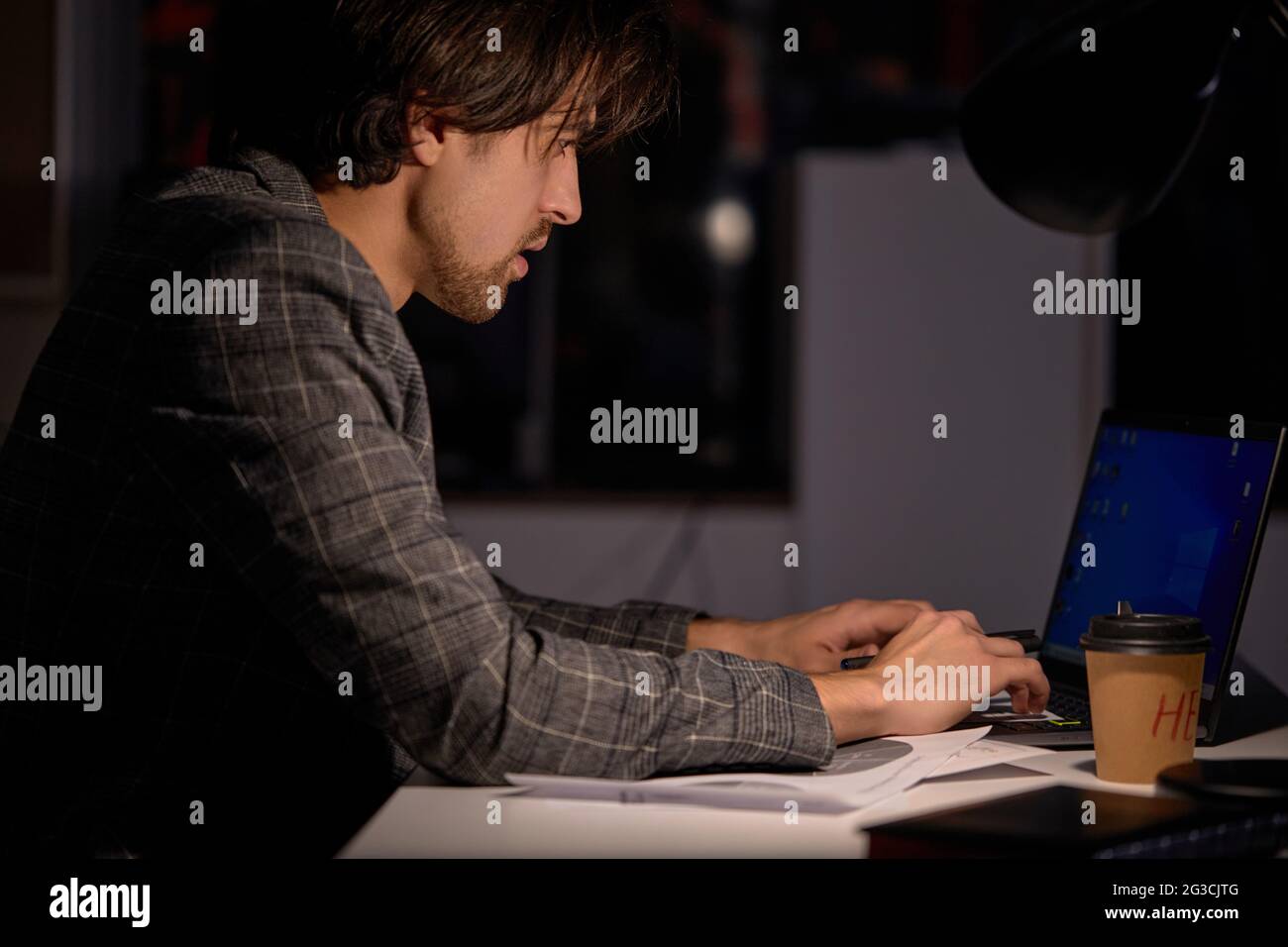 Busy businesswoman engaged laptop papers hi-res stock photography and ...