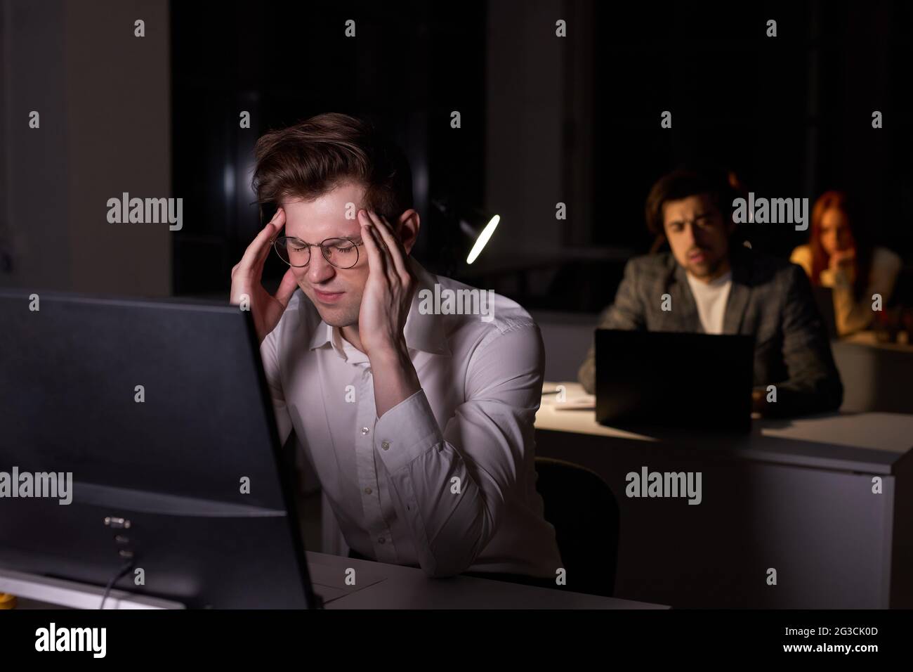 Young Caucasian Guy In Formal Wear Having Headache And Chronic Work ...