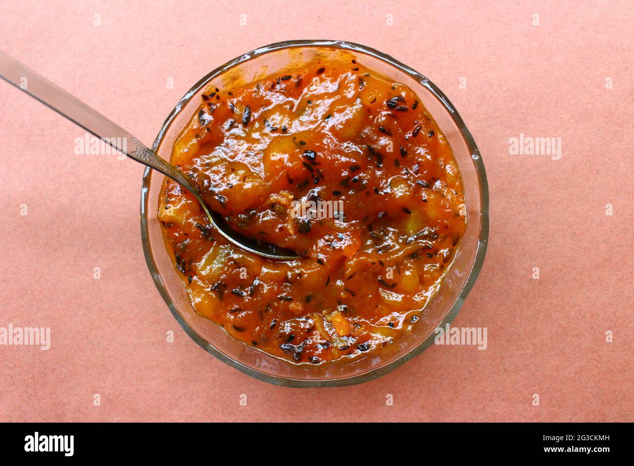 Closeup shot of a sweet and sour raw mango launji in a glass bowl ...