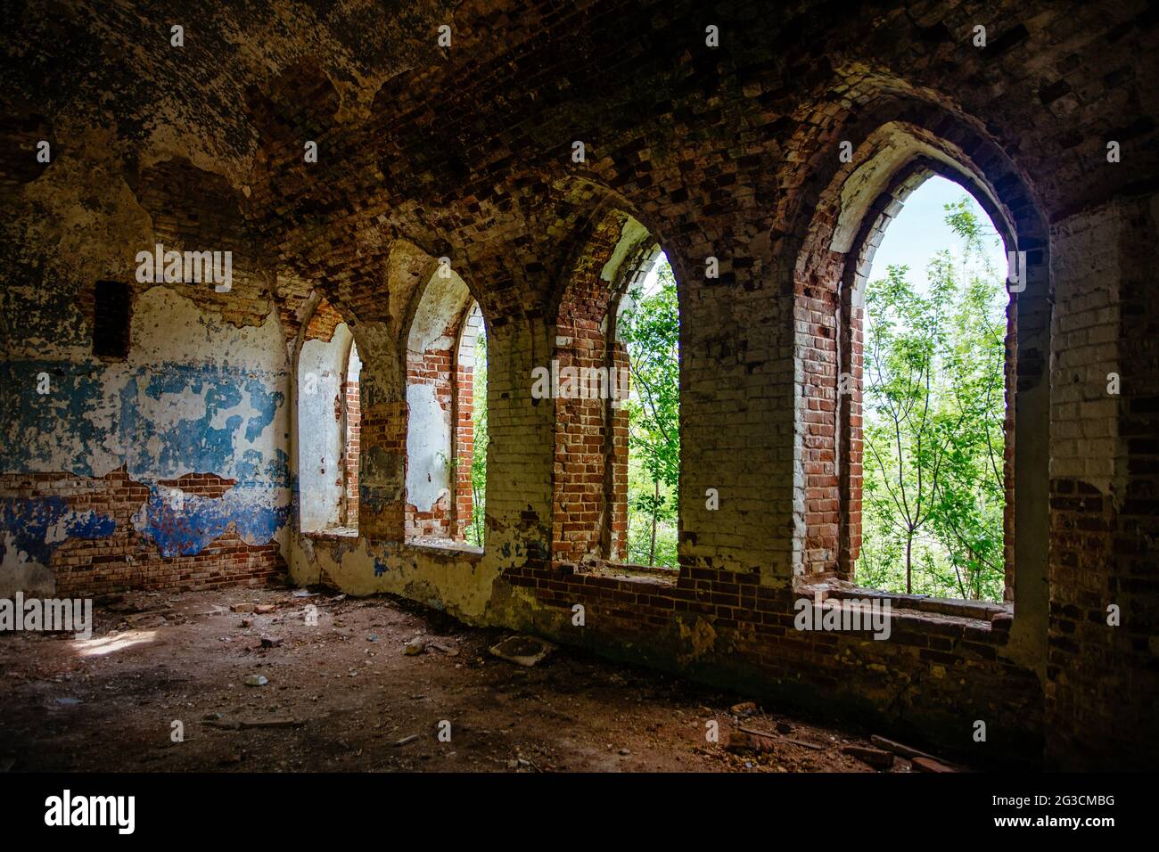 Inside the old ruined red brick church in gothic style Stock Photo - Alamy
