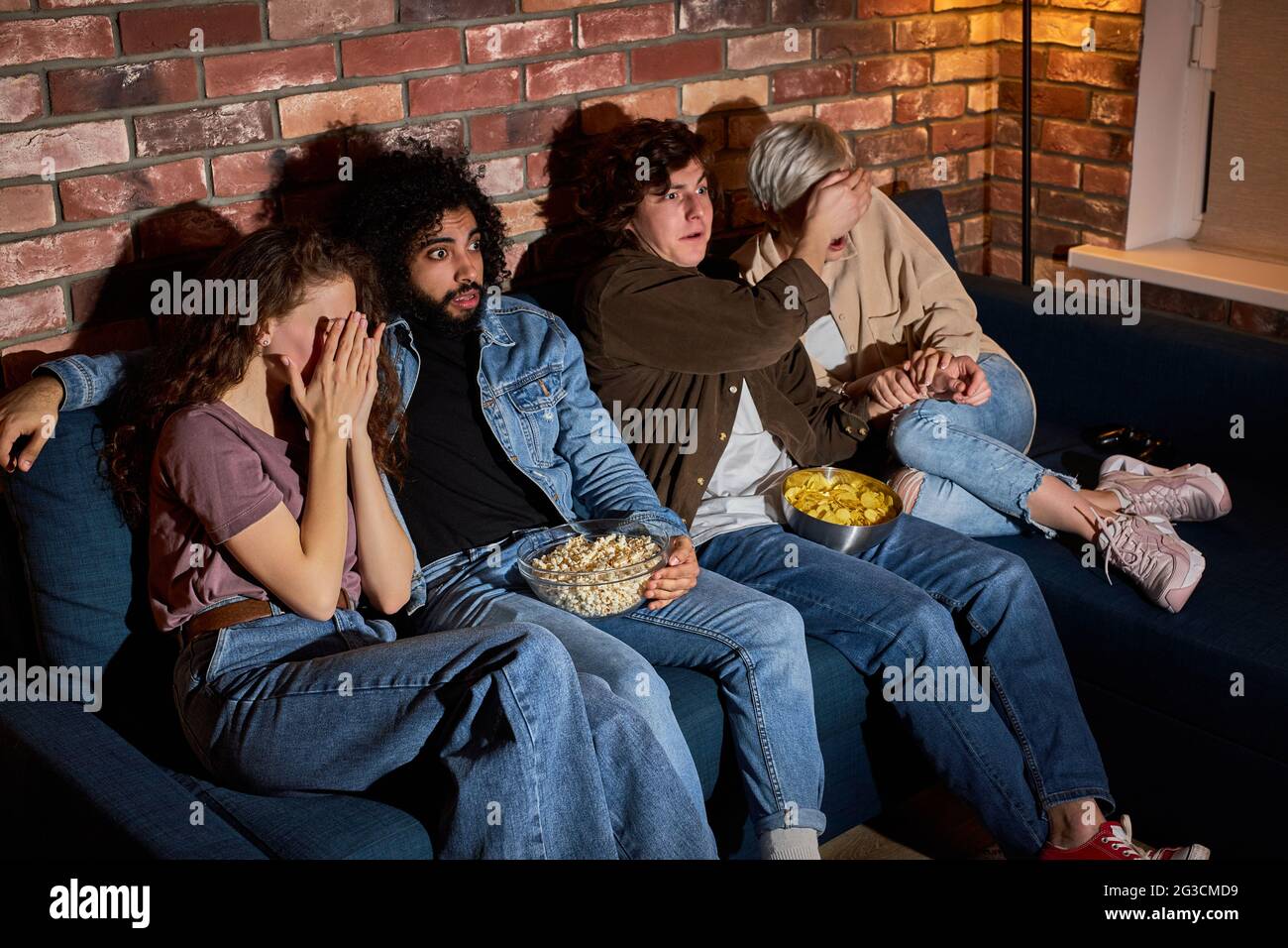 I am afraid. Intimidated friends watching horror cinema with interest ...