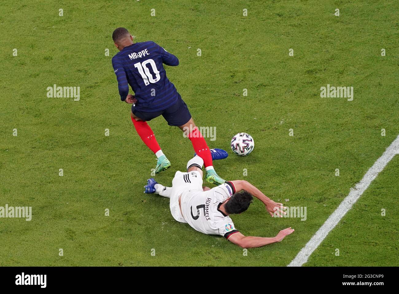 MUNICH, GERMANY - JUNE 15: Kylian Mbappe of France, Mats Hummels of ...