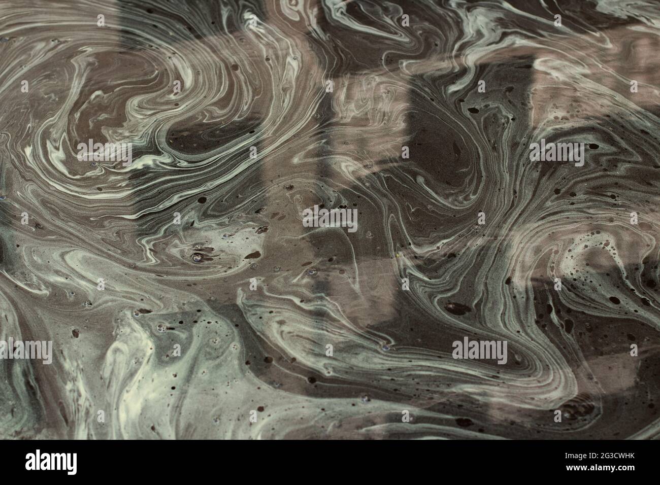 Pollen in a puddle. Beautiful stains in the water. Brownian motion of ...