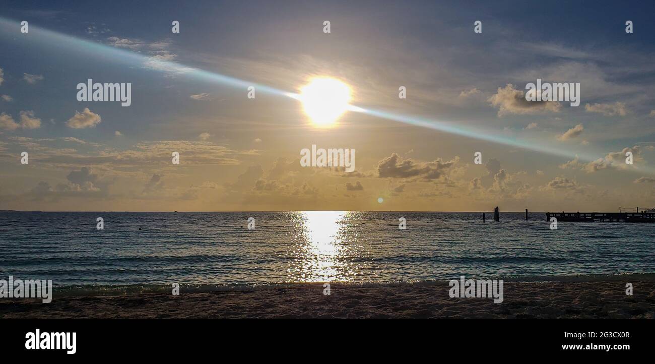 Intense sun on the beach Stock Photo - Alamy