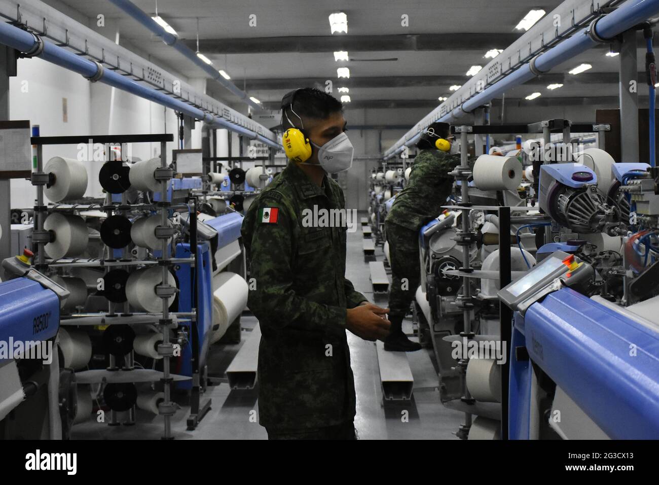 MEXICO CITY, MEXICO - JUNE 15: A military manufactures uniforms for ...
