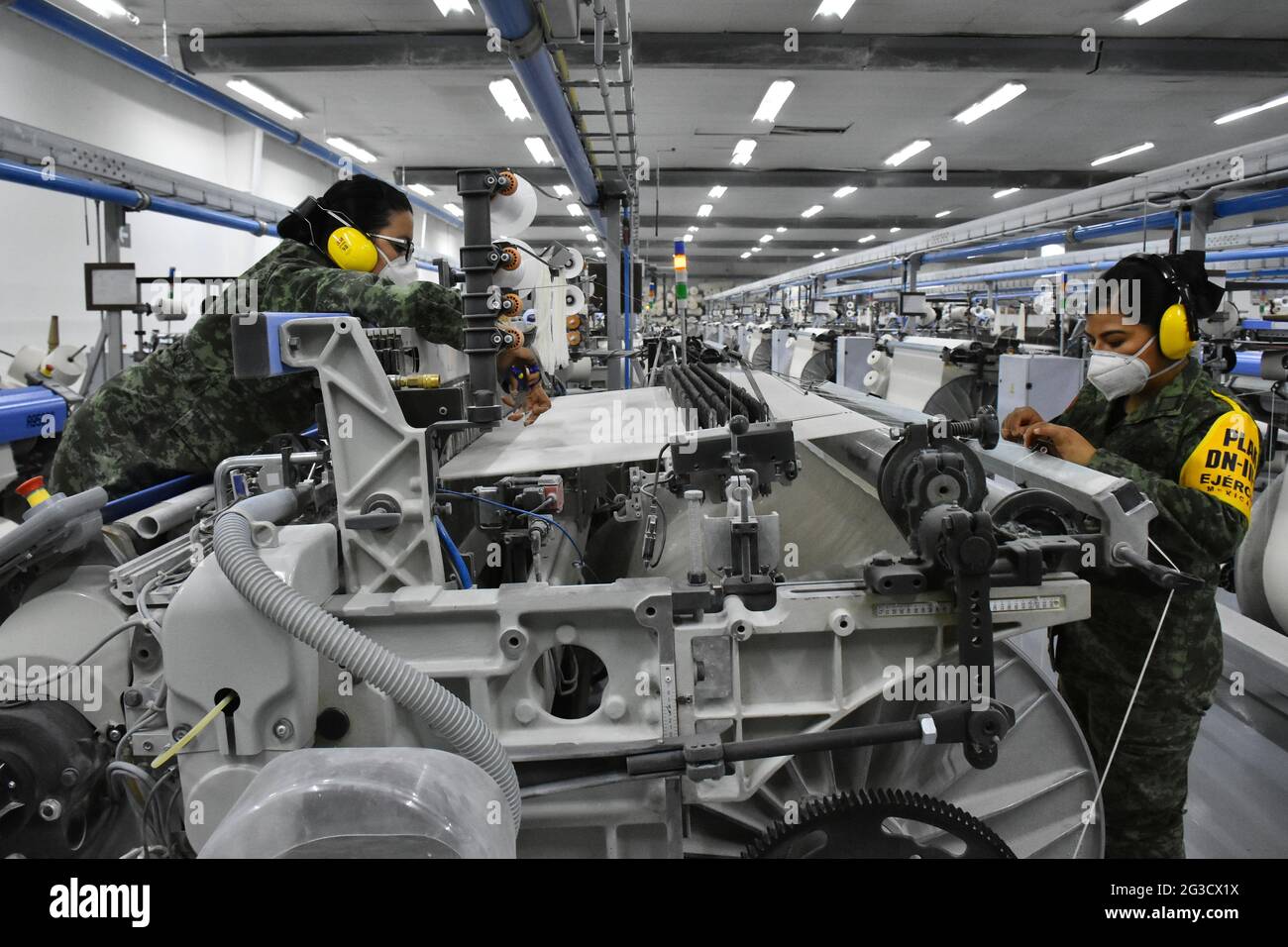 MEXICO CITY, MEXICO - JUNE 15: A military manufactures uniforms for ...