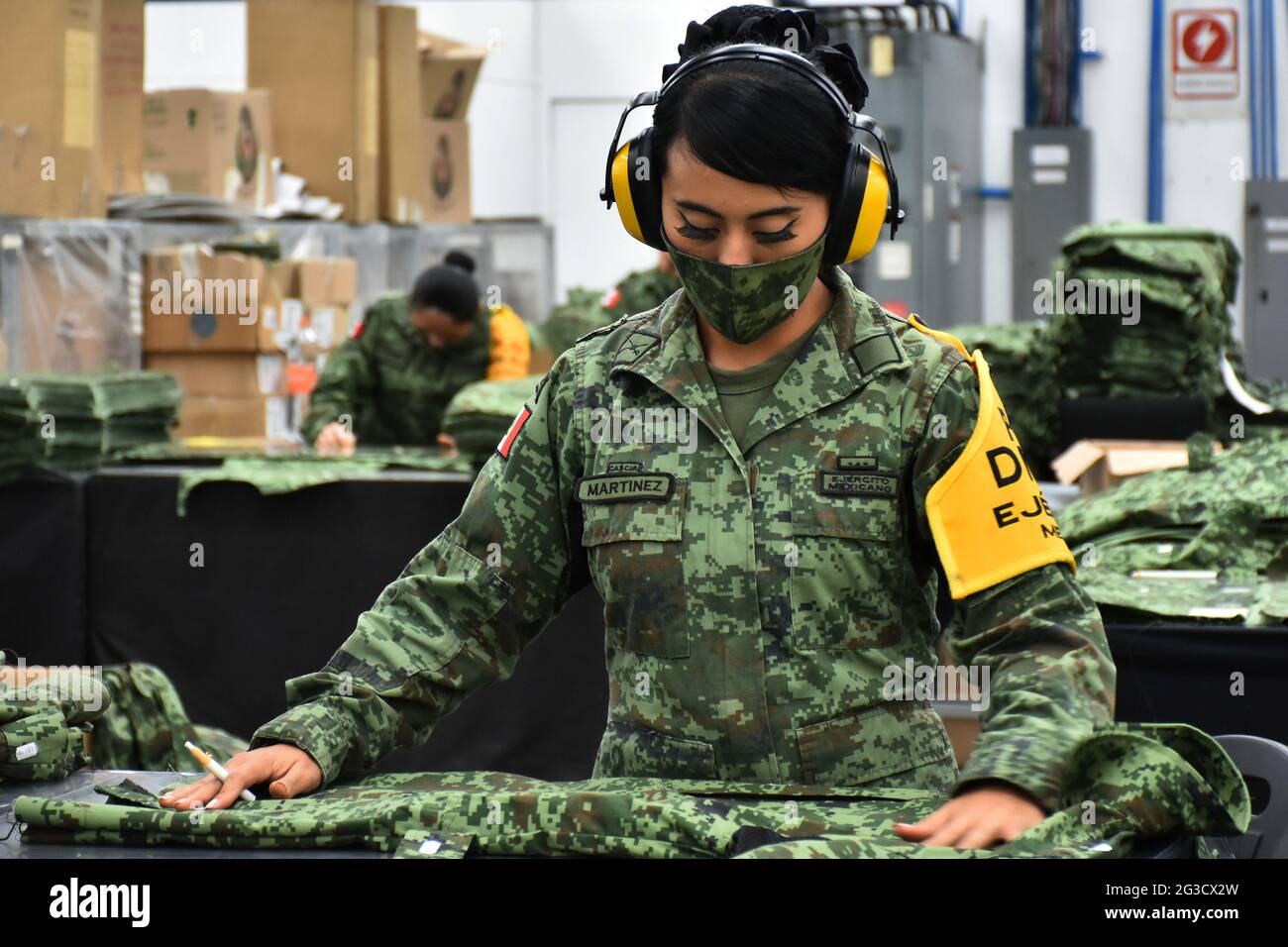 MEXICO CITY, MEXICO - JUNE 15: A military manufactures uniforms for ...