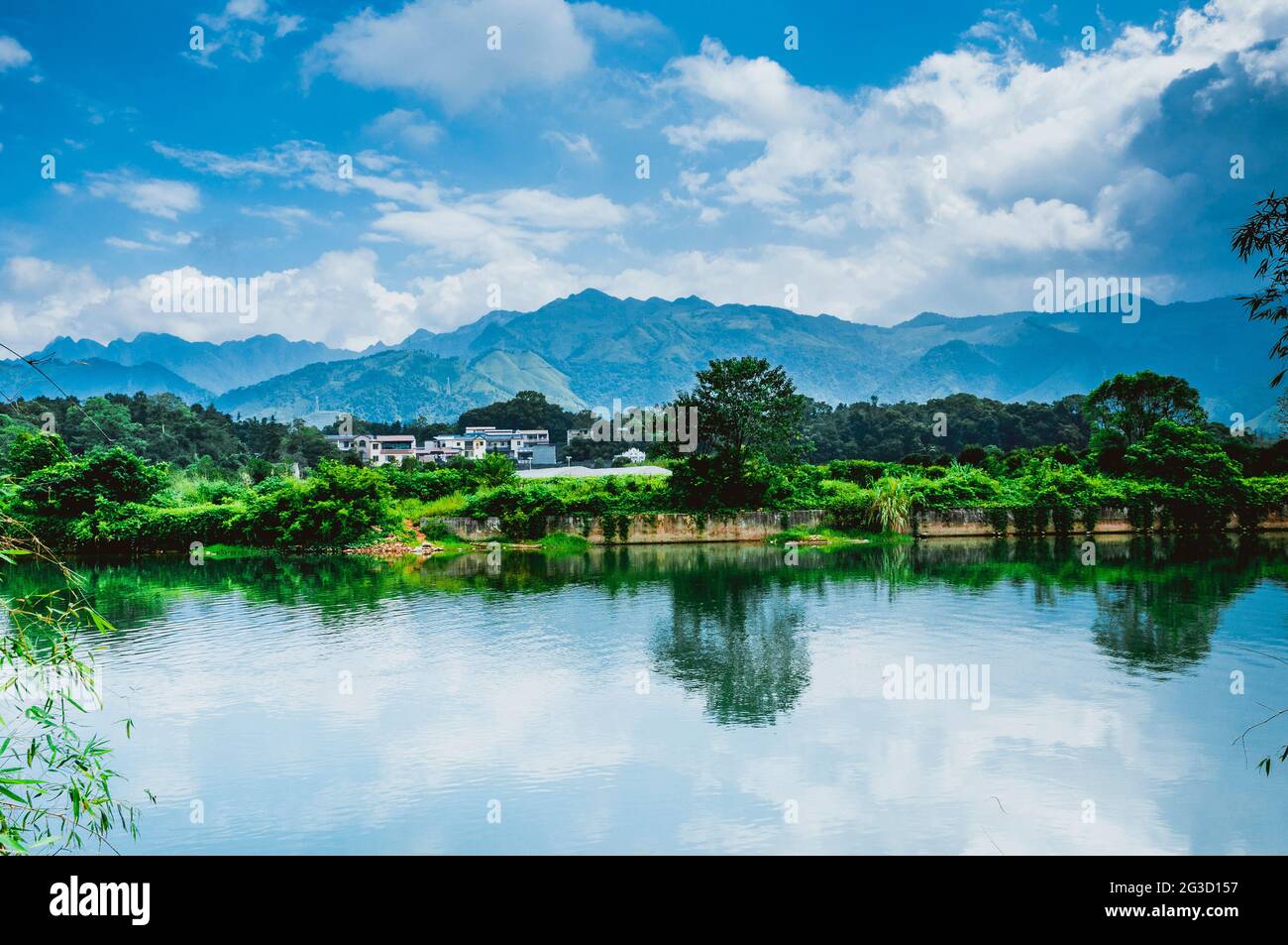 The countryside scenery with a blue sky in summer Stock Photo - Alamy
