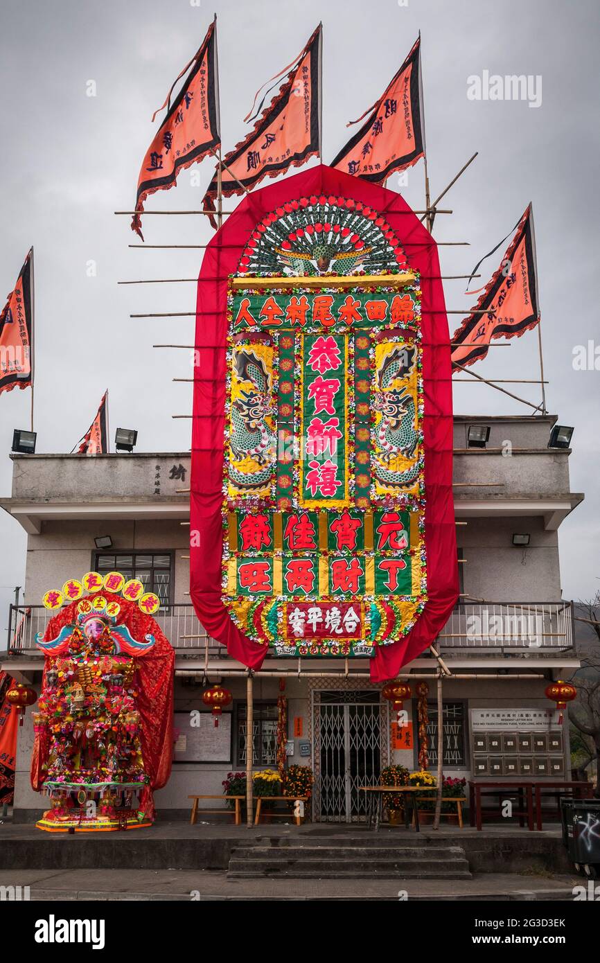 Flower plaques ('fa paai'), flags and lanterns marking Chinese New Year ...