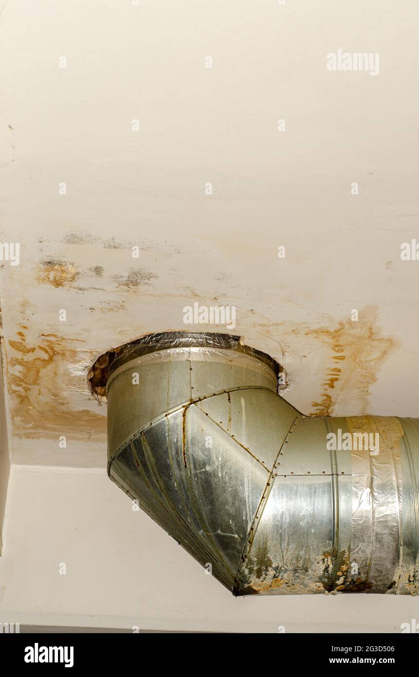 Closeup of a ventilation pipe and dirty ceiling in the kitchen Stock ...