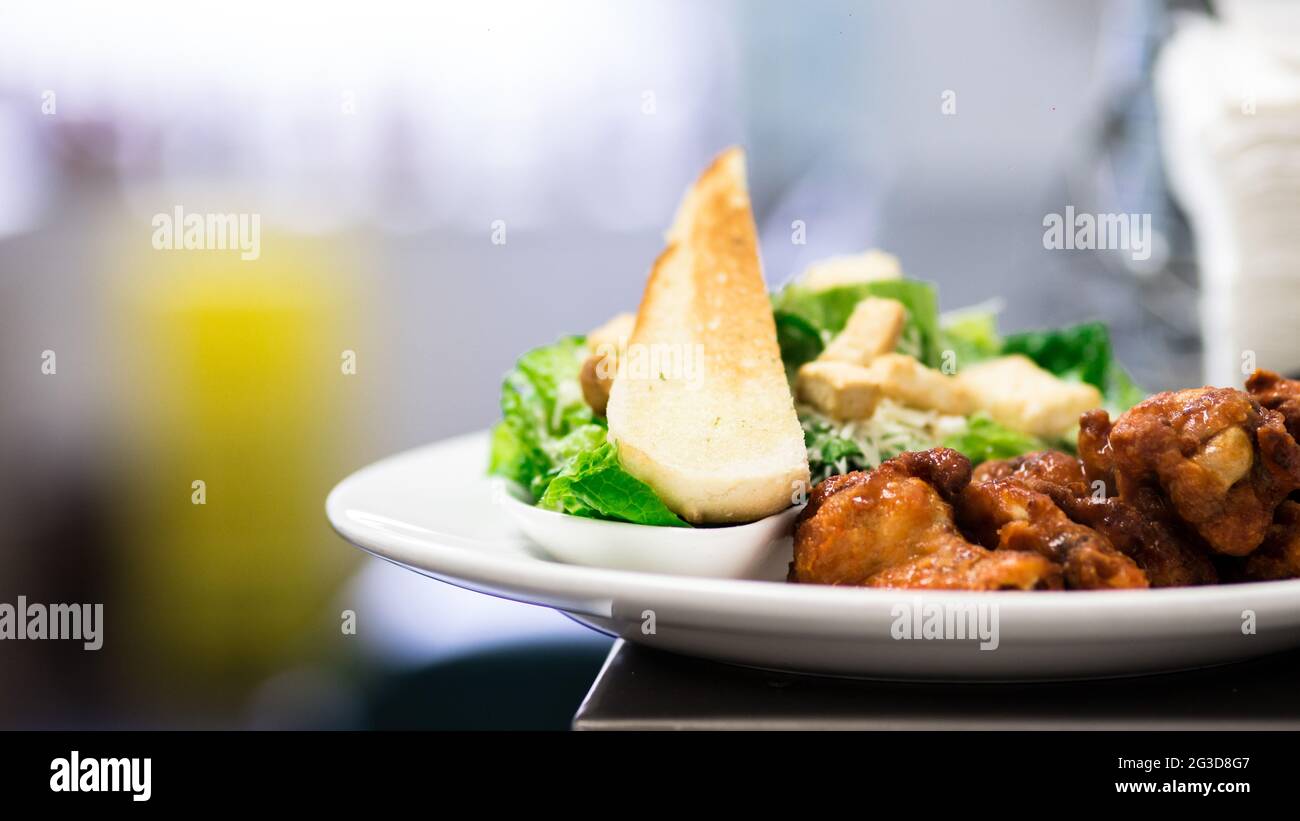 Selective focus of fresh salad and cooked meat on a plate Stock Photo ...