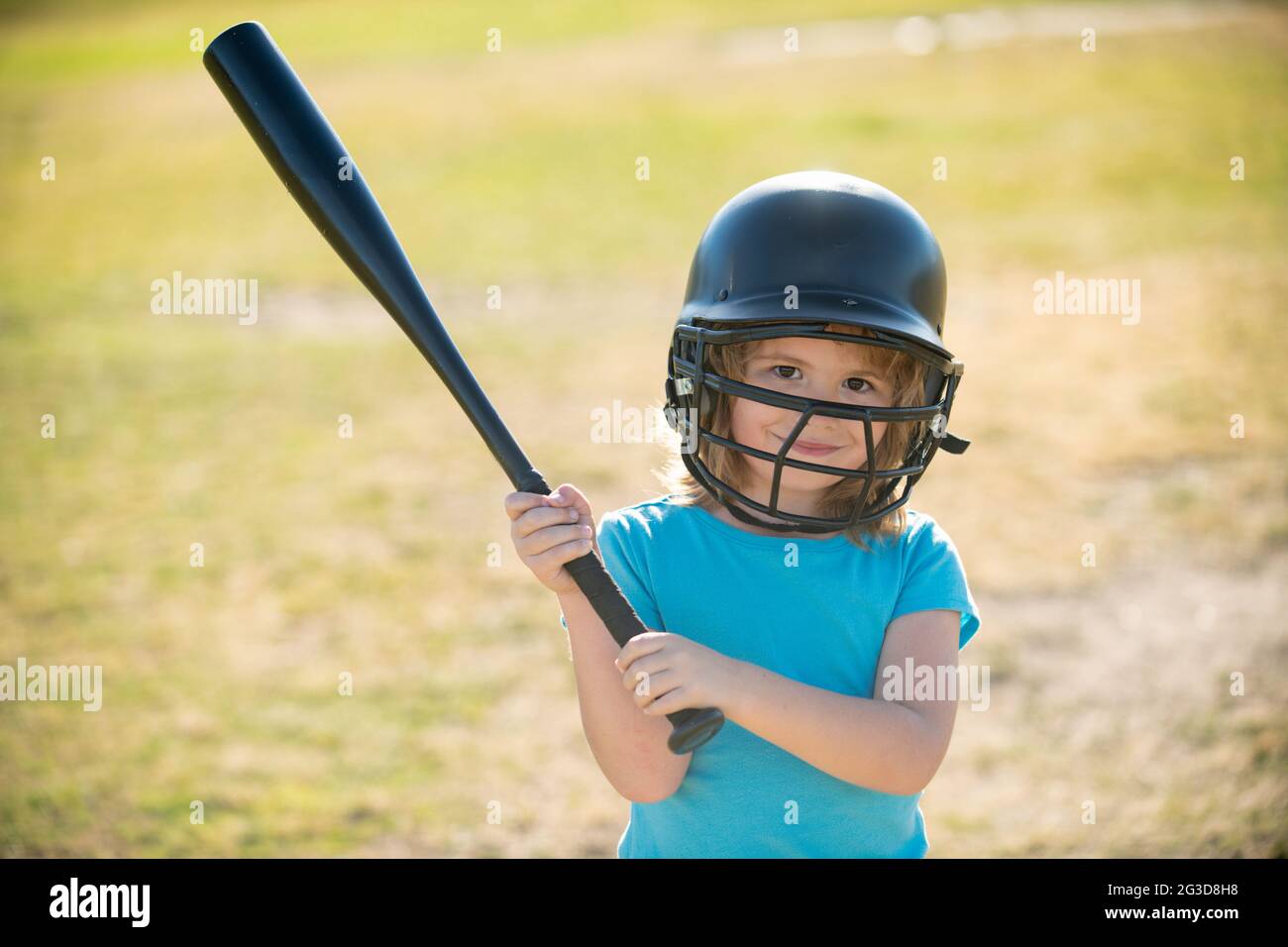 Little boy posing with a baseball bat. Portrait of kid playing baseball ...