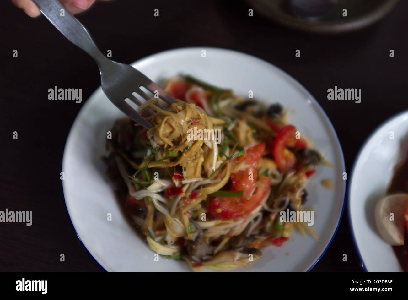 Papaya salad with shrimp and pork sausage vietnamese Stock Photo - Alamy
