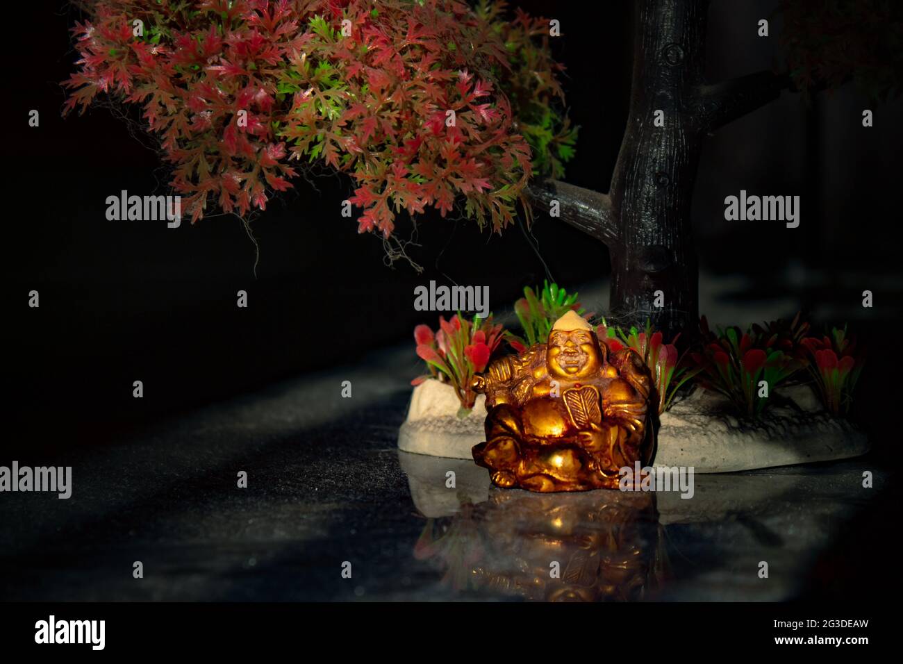 Laughing Buddha Statue on under the Tree. Statue of Laughing Buddha ...
