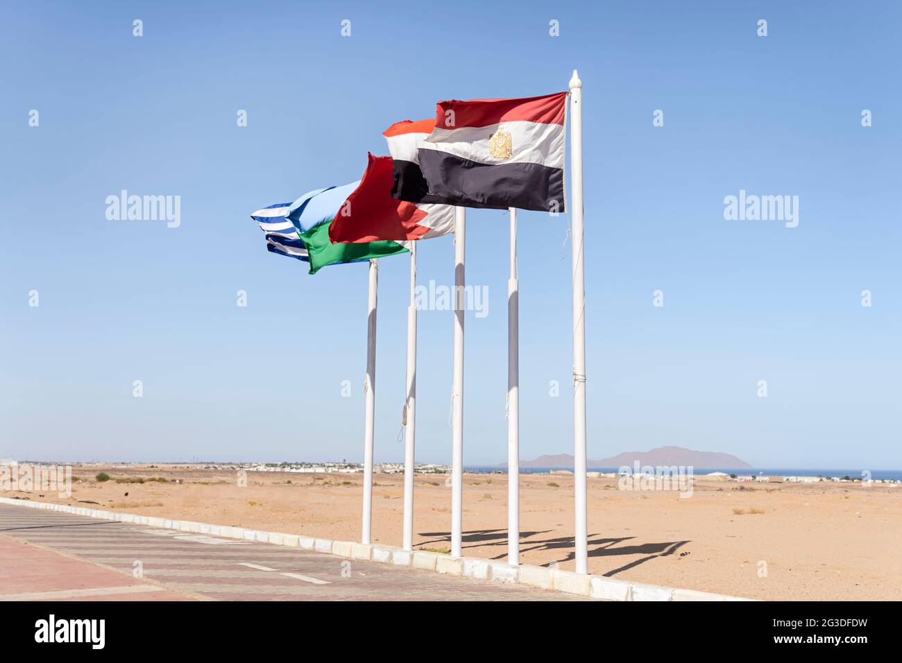 Flags of states on the background of mountains, desert and sky Stock ...