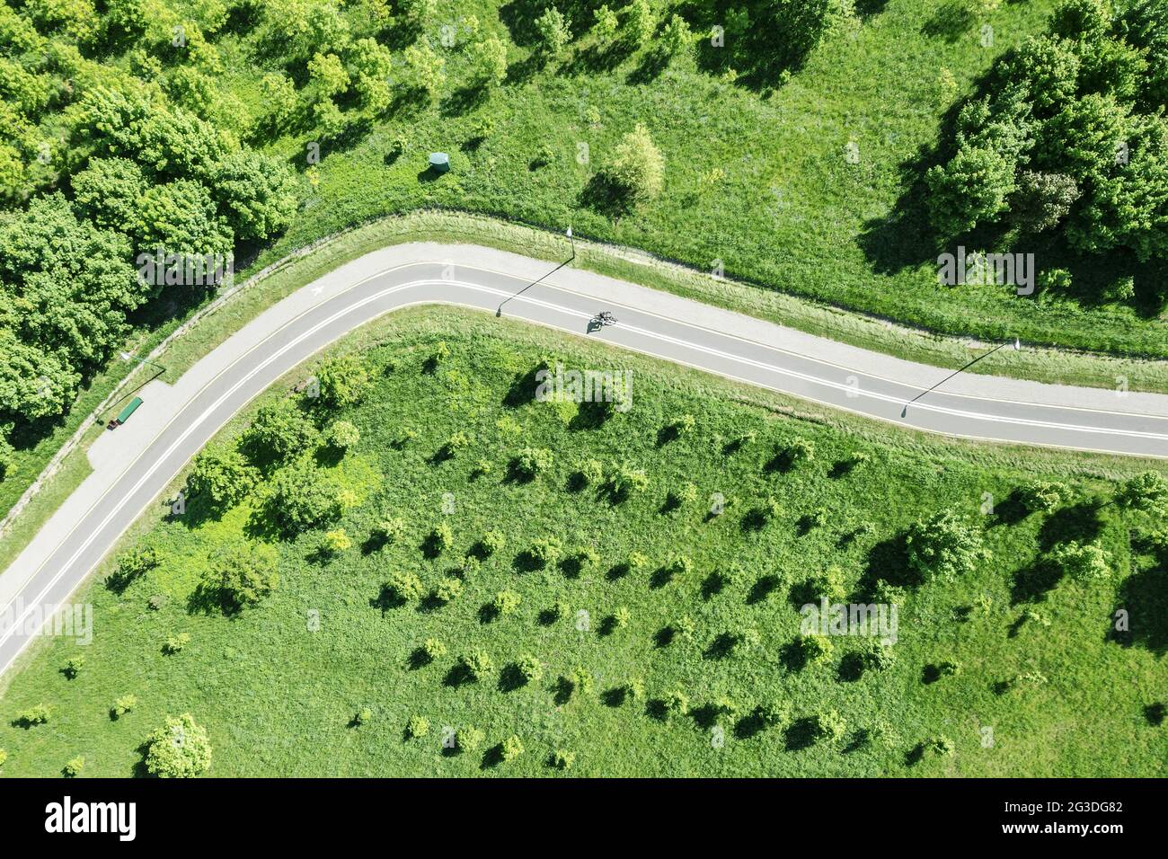 Winding road aerial view bike hi-res stock photography and images - Alamy