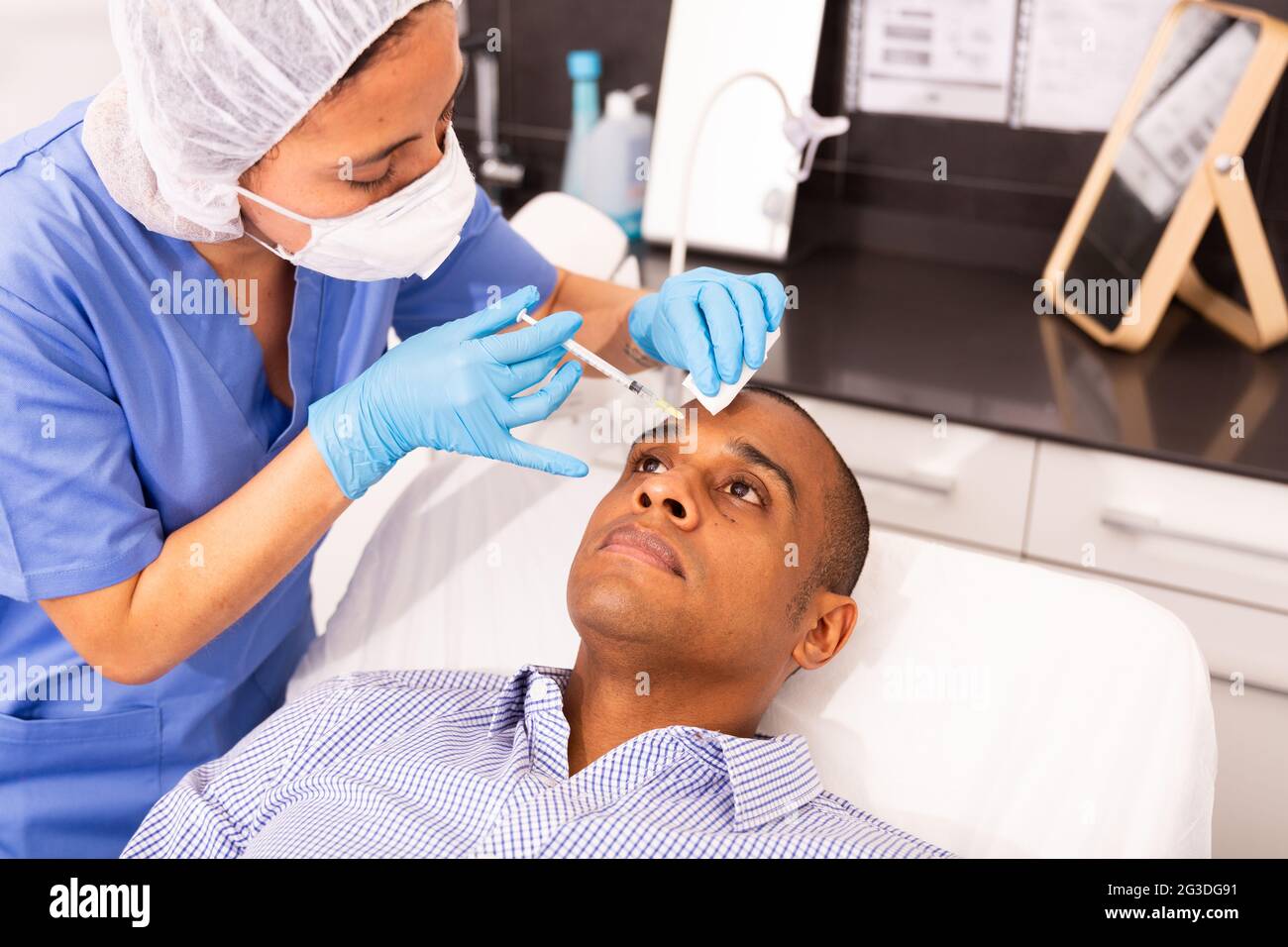 Female getting injections hyaluronic hi-res stock photography and ...