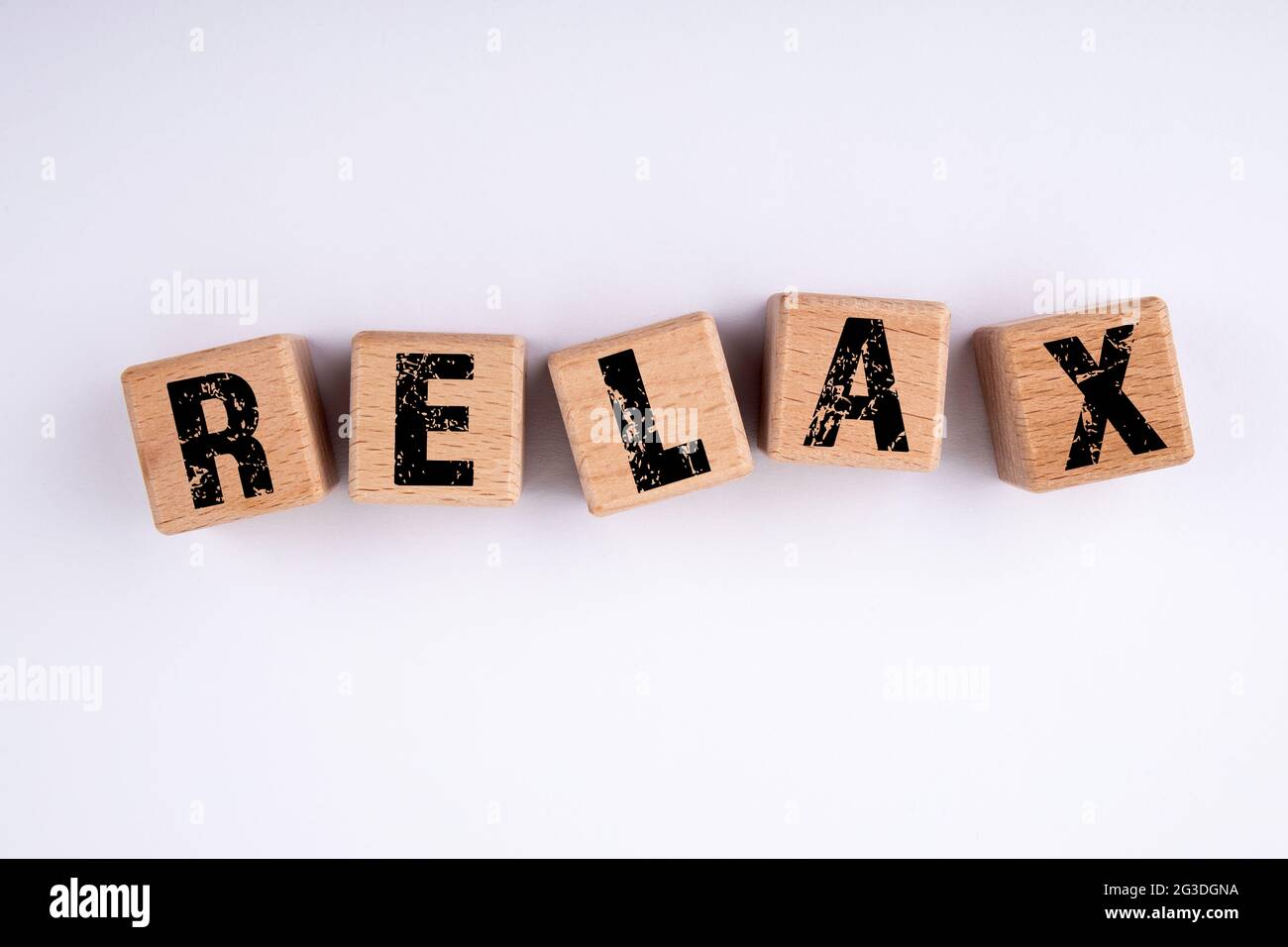 Relax. Wooden cubes on a white background Stock Photo - Alamy