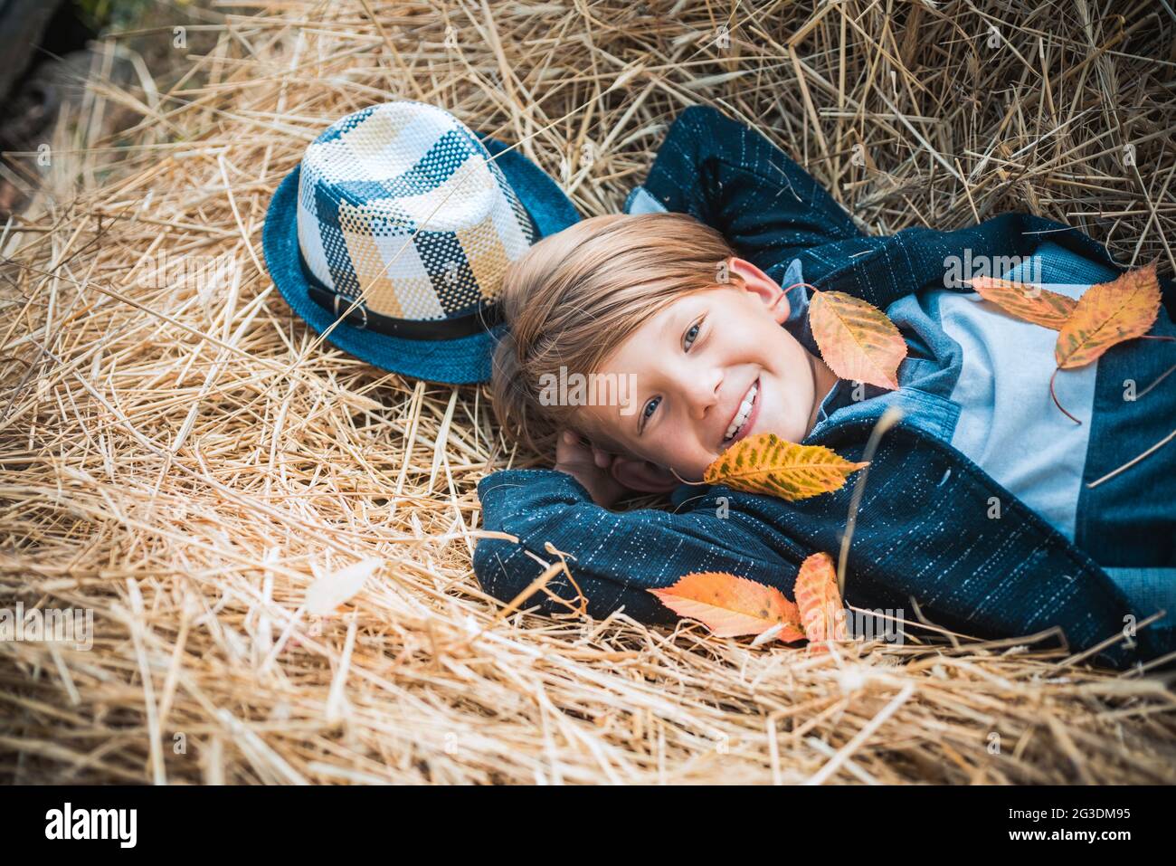 Autumn Clothing and color kids trends. Boy on a breeze in an autumn ...