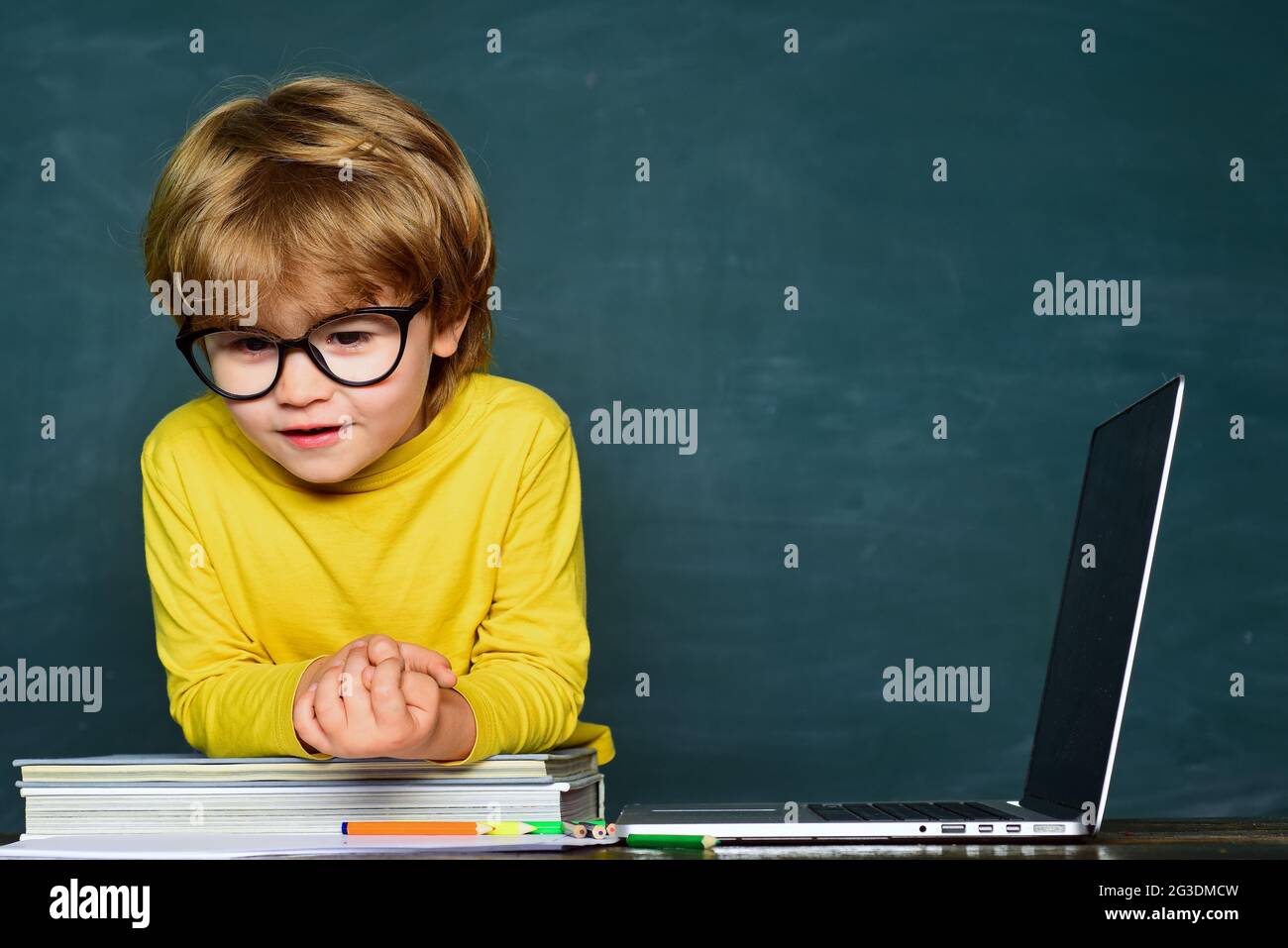 Kids school. Hard exam. Education first. Elementary school. Boy from ...