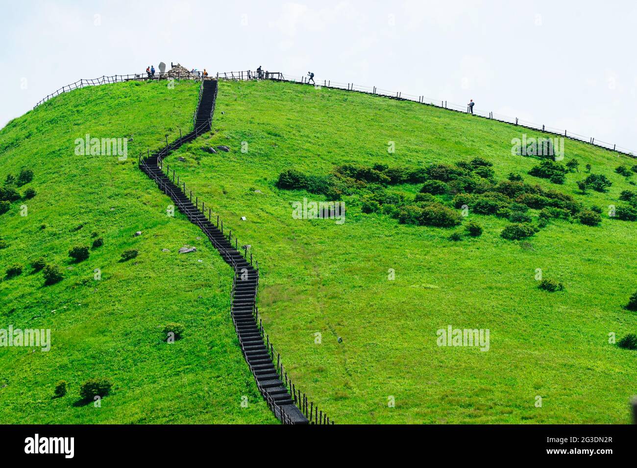 Long pathway going to the top of hill Stock Photo - Alamy