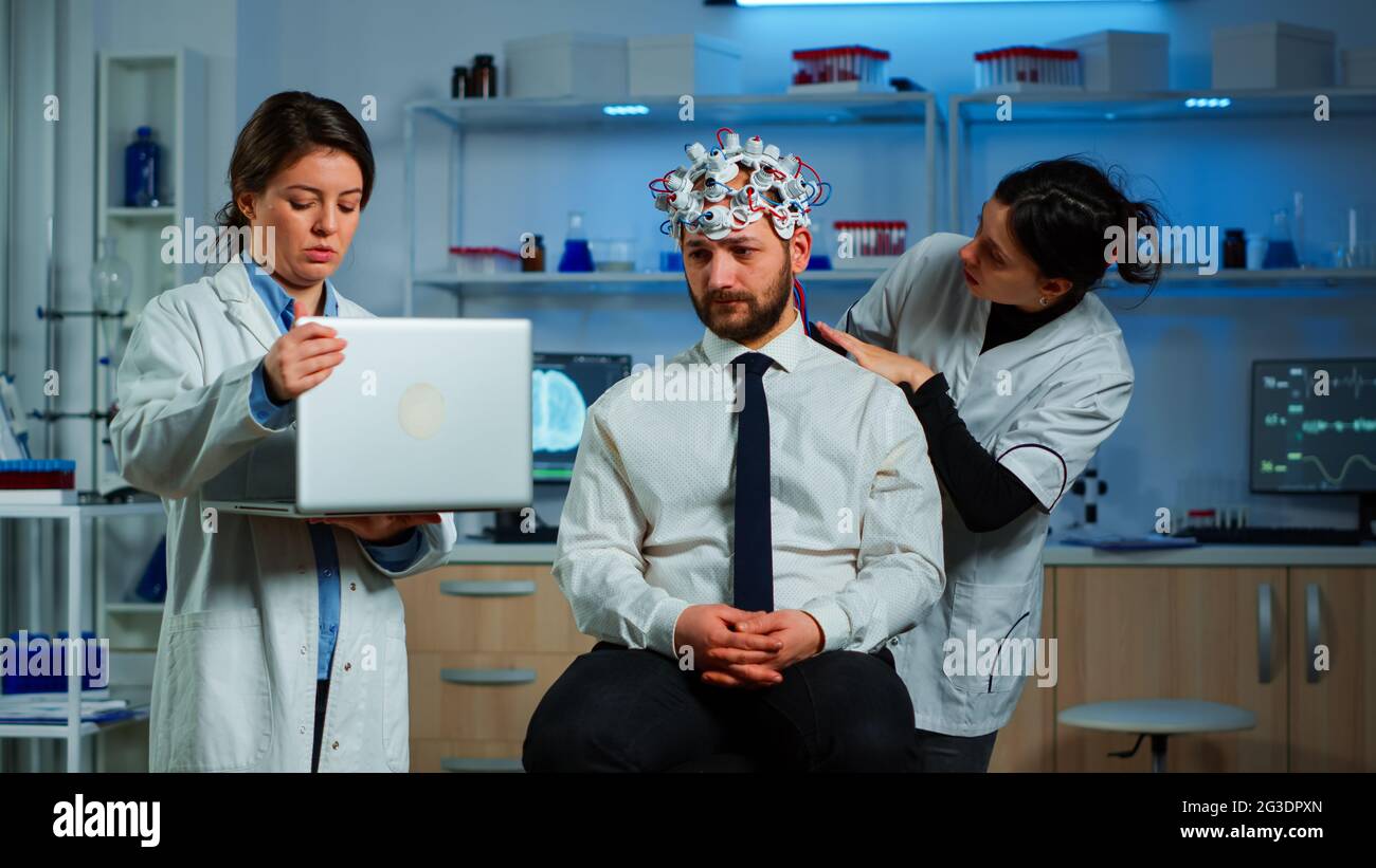Medic in neuroscience working in neurological research laboratory ...