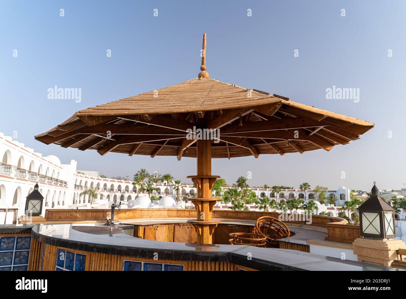 Outdoor lobby bar under a straw umbrella. The concept of recreation at ...
