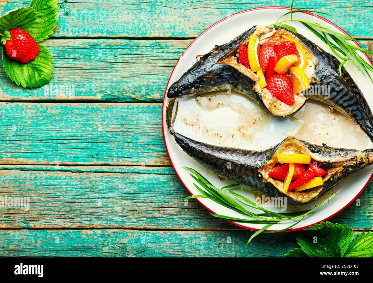 Fish roasted with berries and lemon.Summer fish dish,baked mackerel ...