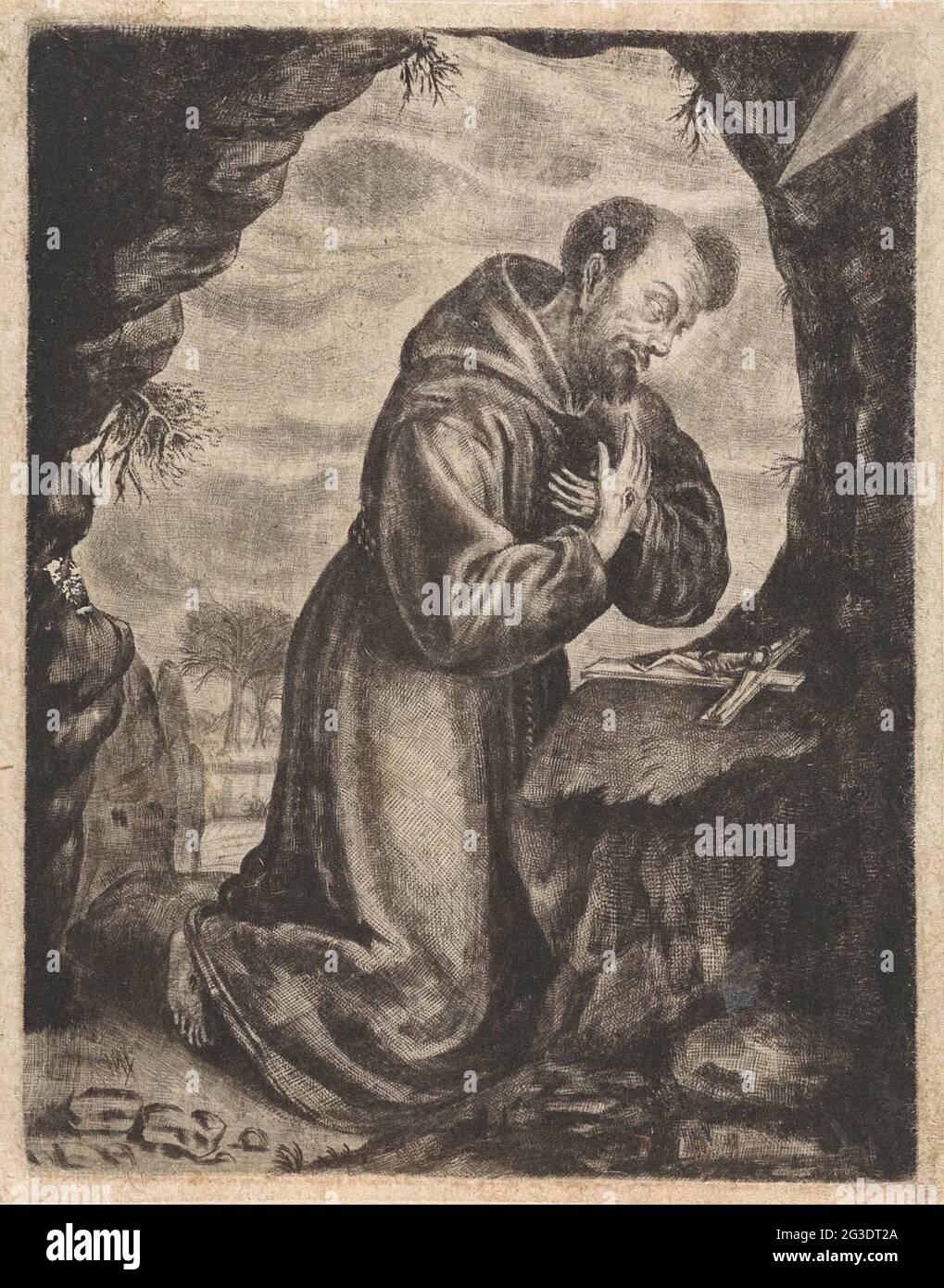 Praying hermit Stock Photo - Alamy