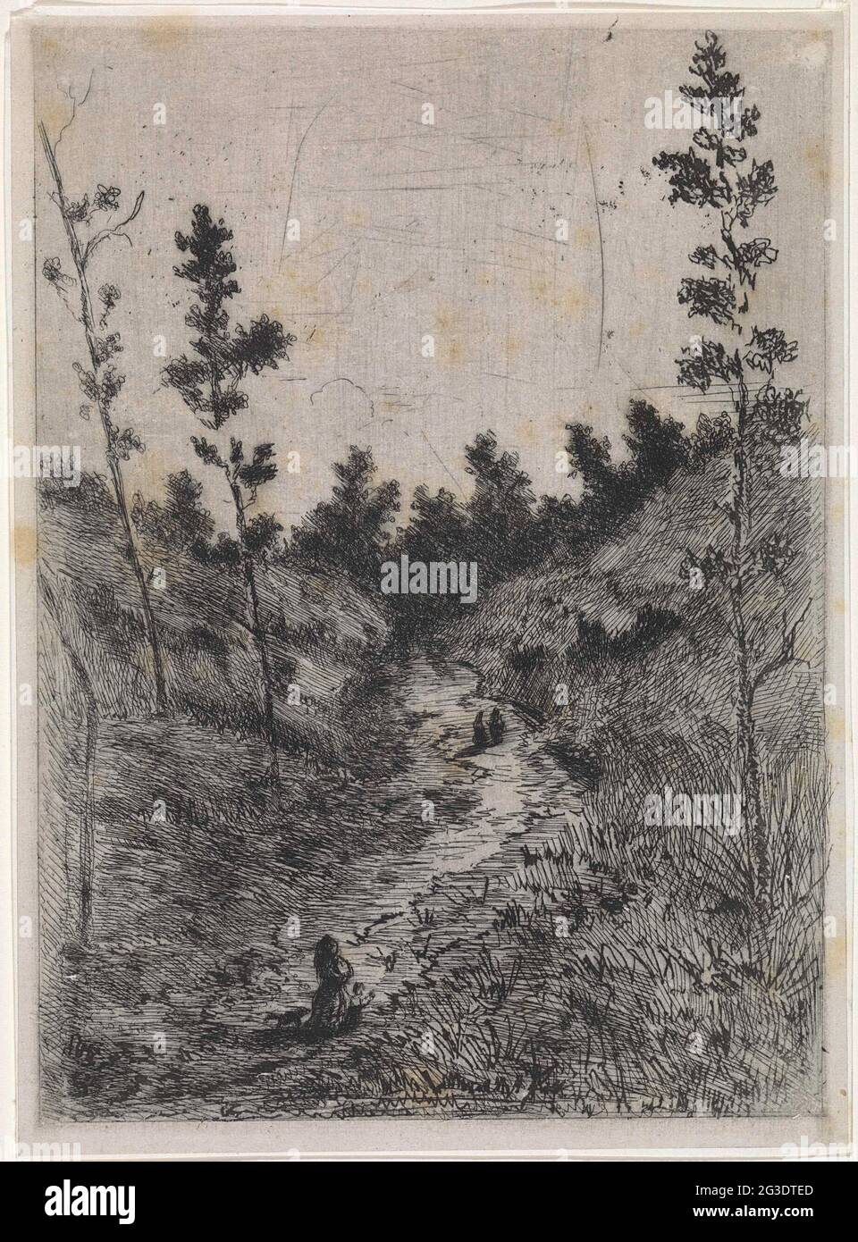 Hikers on a path between two hills Stock Photo - Alamy