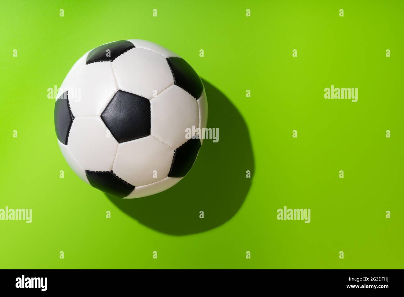 top view of soccer ball on green background, concept football time ...