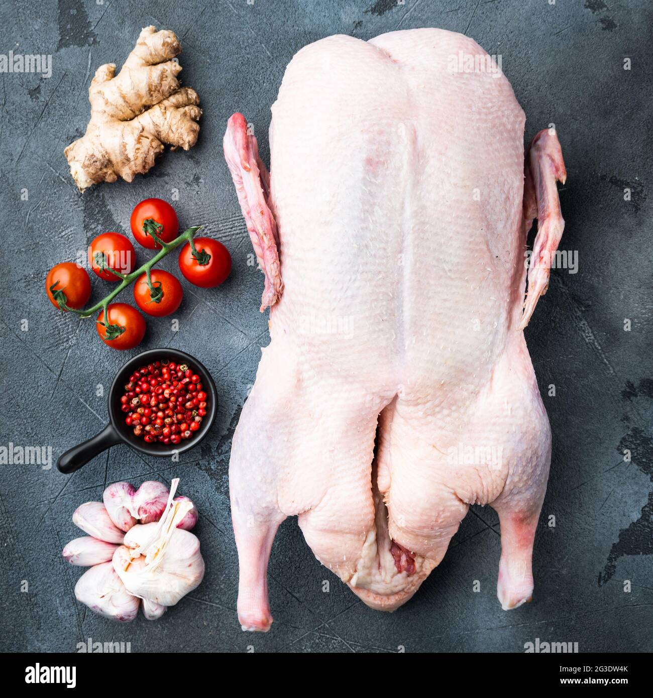 Whole raw duck meat on grey background, top view Stock Photo - Alamy