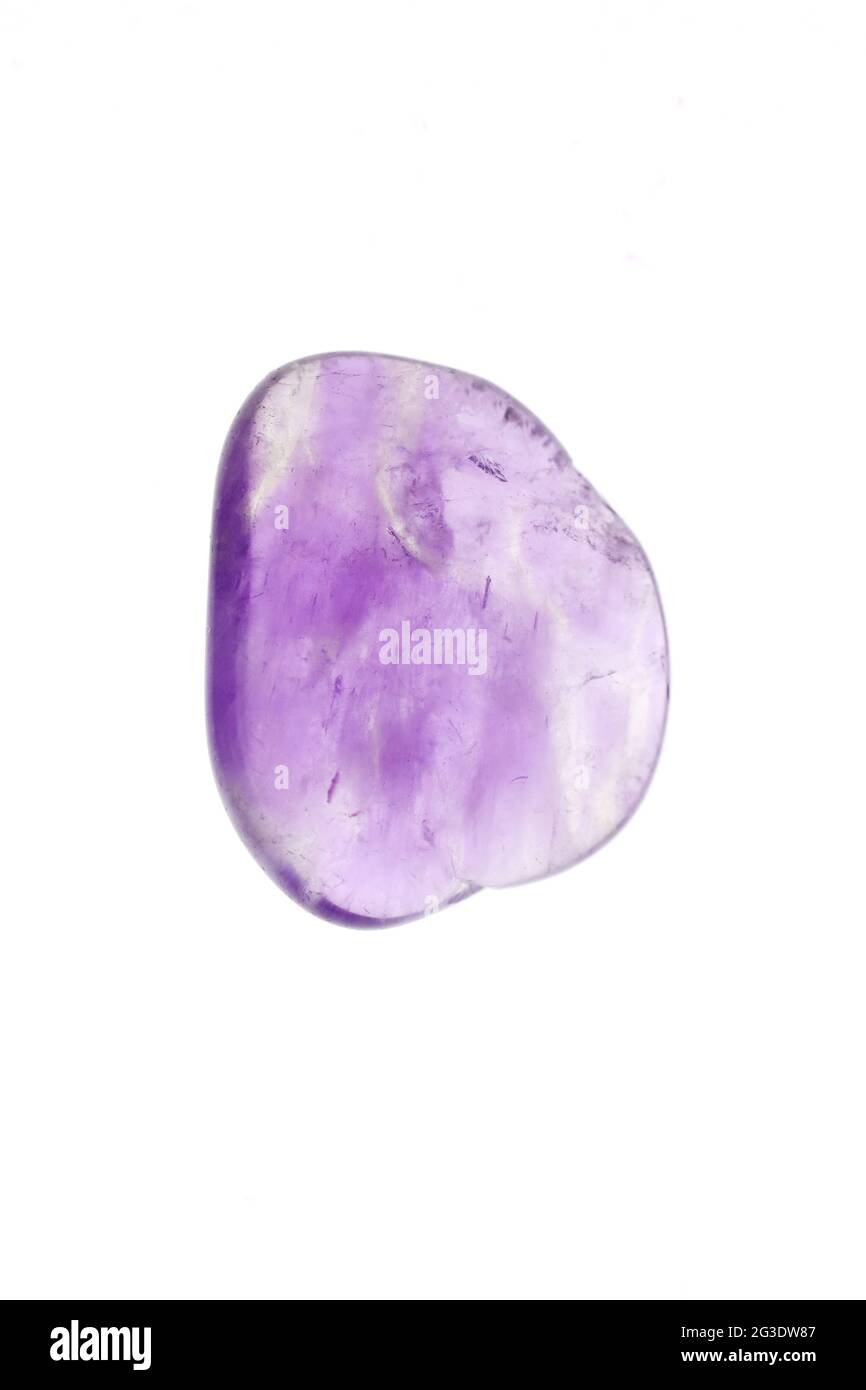 Amethyst jewel stone texture on white light isolated background. Macro ...