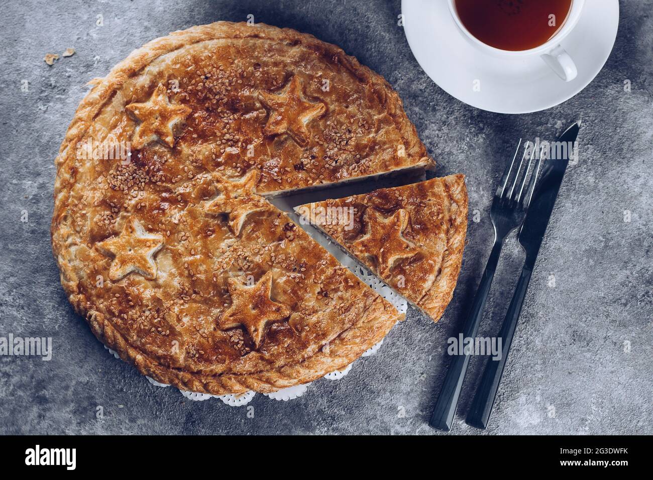Fresh Traditional meat mini pie on plate on concrete table background ...