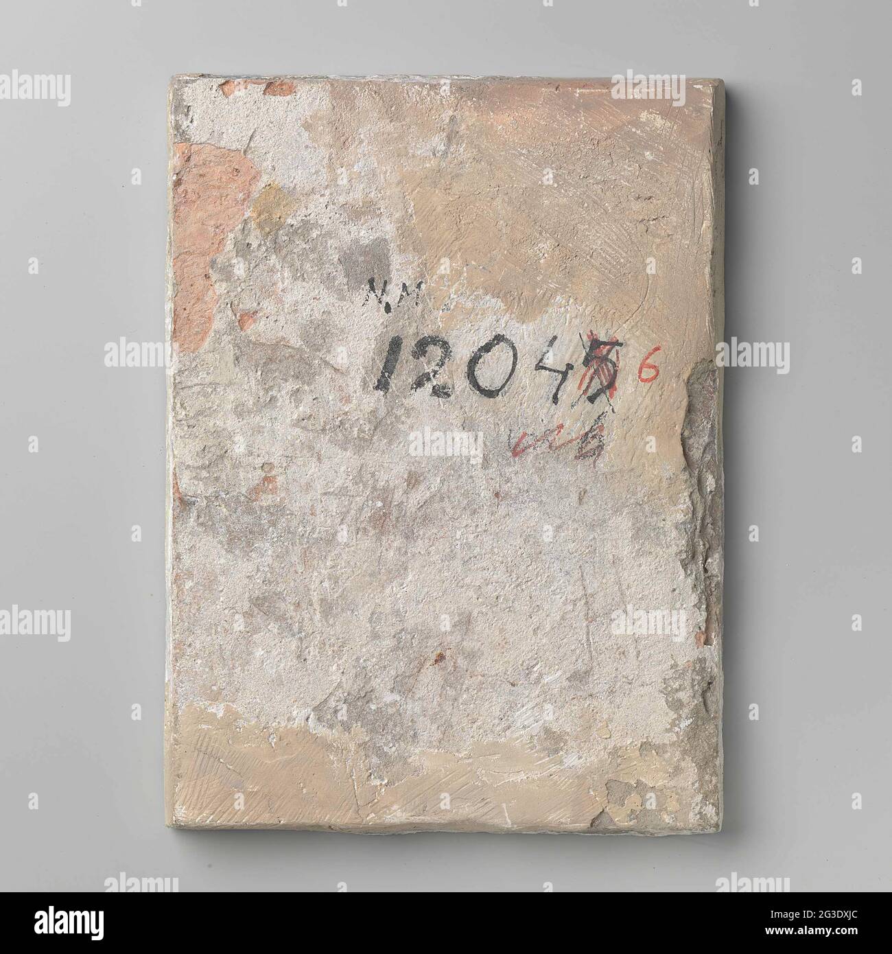 Tile. Tile with a blue painted musketeer under a bow with a mask as a ...