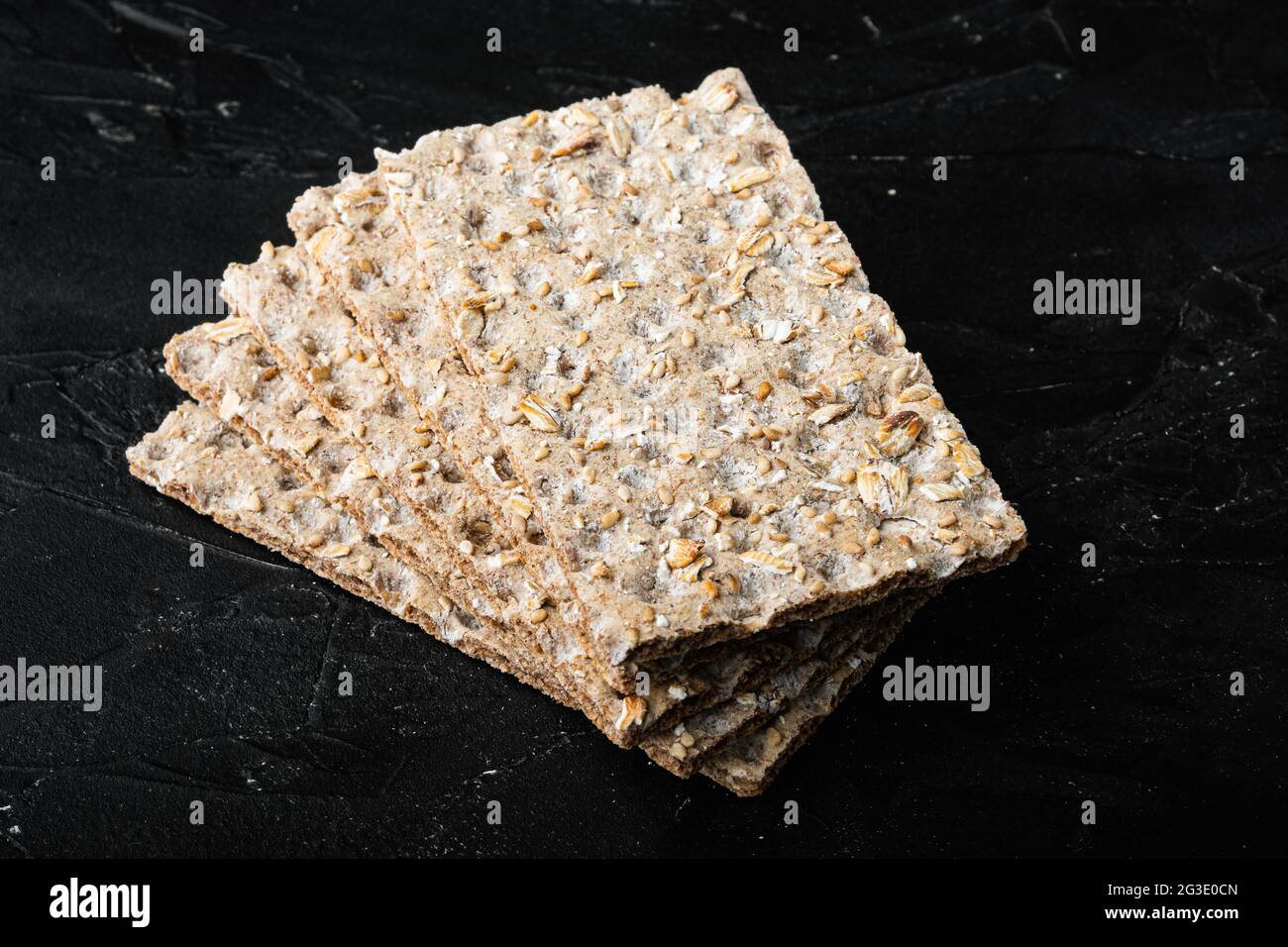 Crunchy crispbread Healthy snack set, on black dark stone table ...