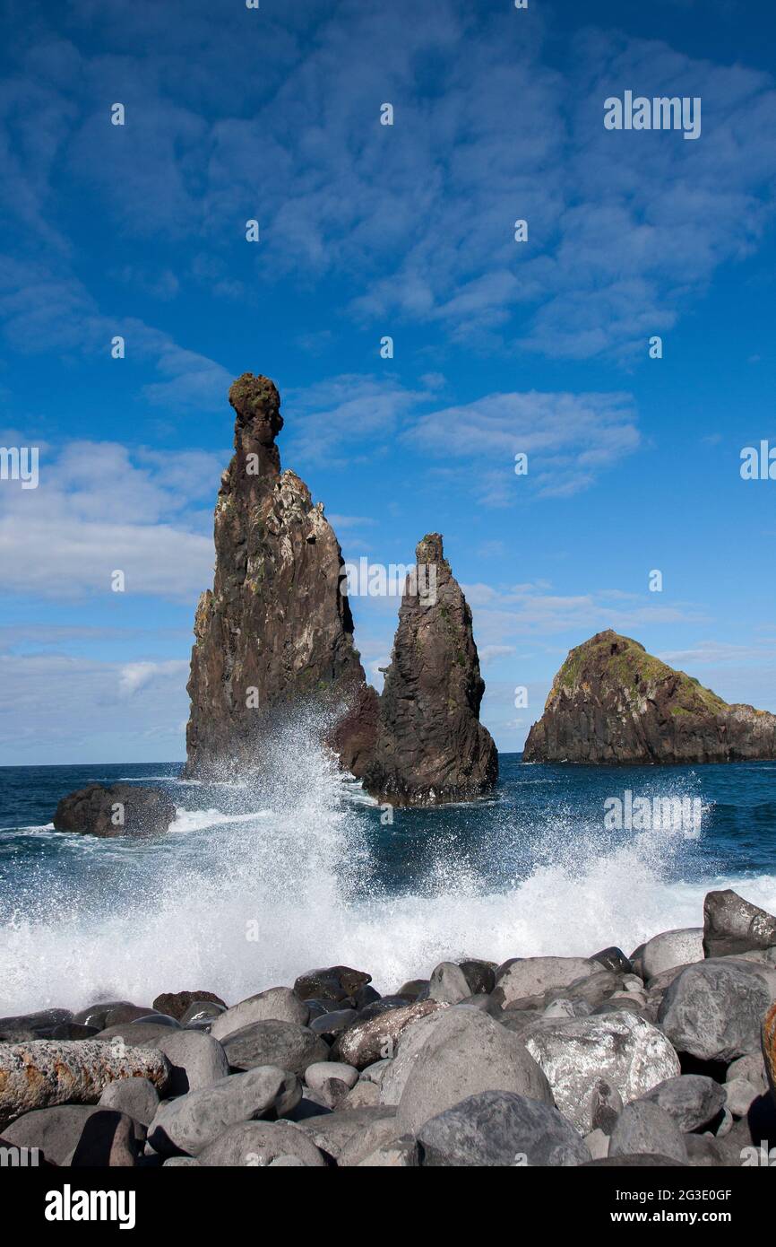 Large triangular seastacks against blue sky at Madeira island, Portugal ...