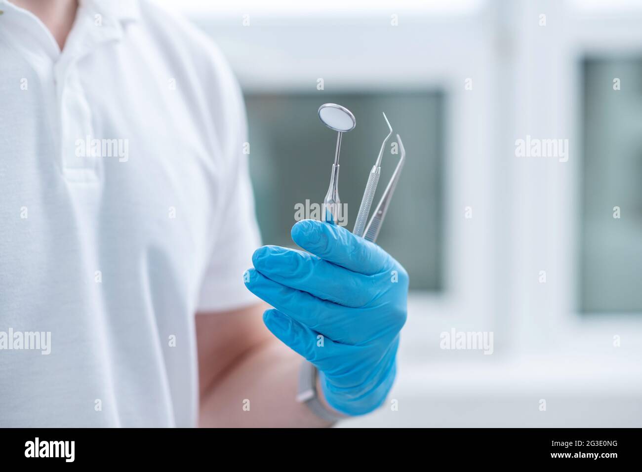 Close up pictire of doctors hands with dental medical tools Stock Photo ...