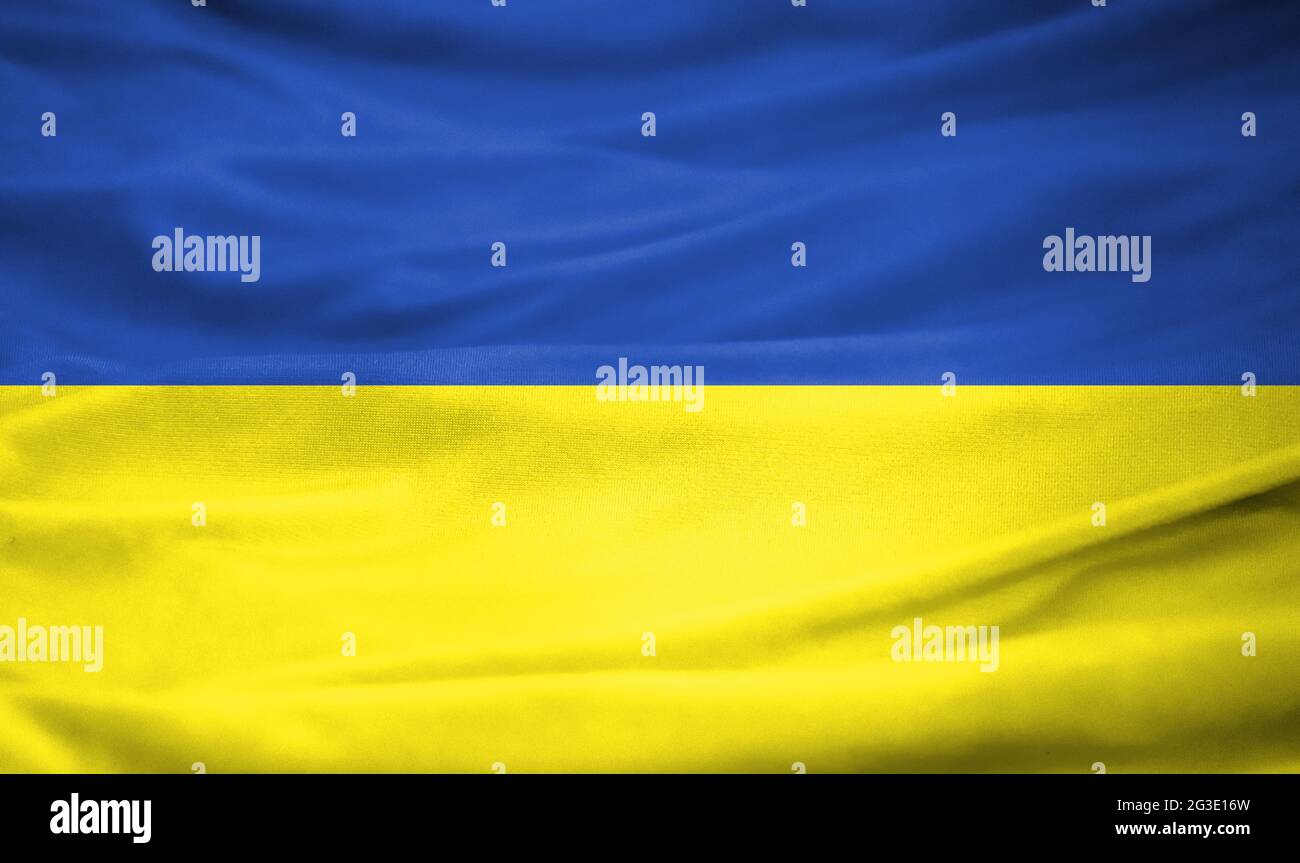 Realistic flag of Ukraine on the wavy surface of fabric Stock Photo - Alamy
