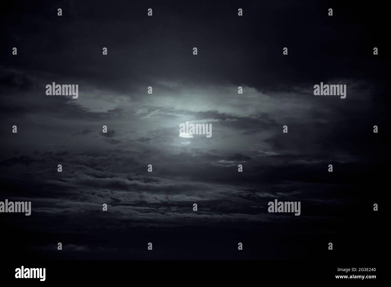 Dark overcast full moon night sky Stock Photo - Alamy