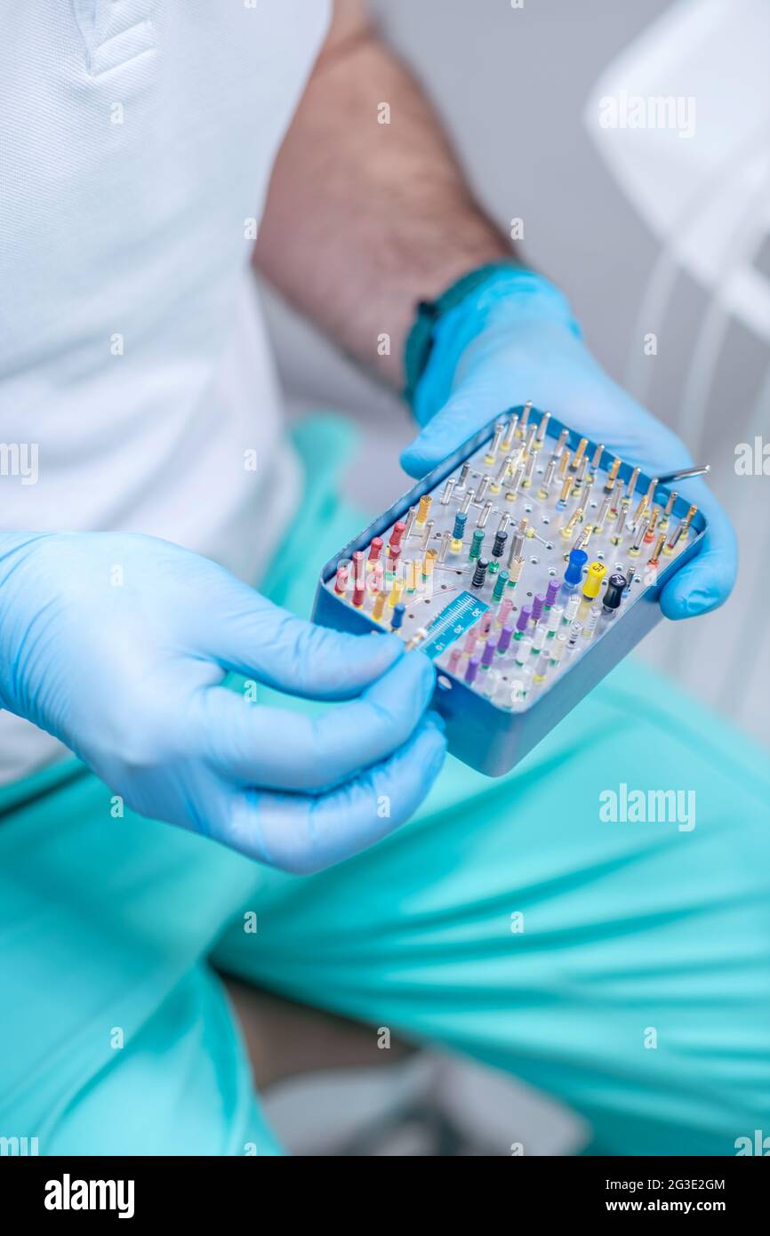 Close up picture of doctors hands with dental medical tools Stock Photo ...