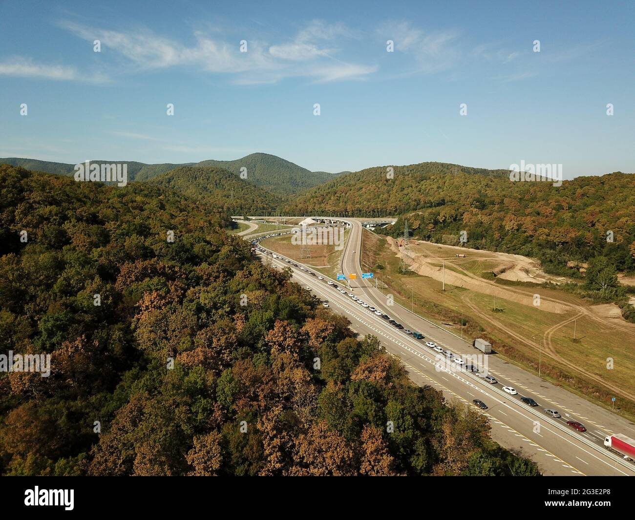 Aerial view of the rural highway during autumn season Stock Photo - Alamy
